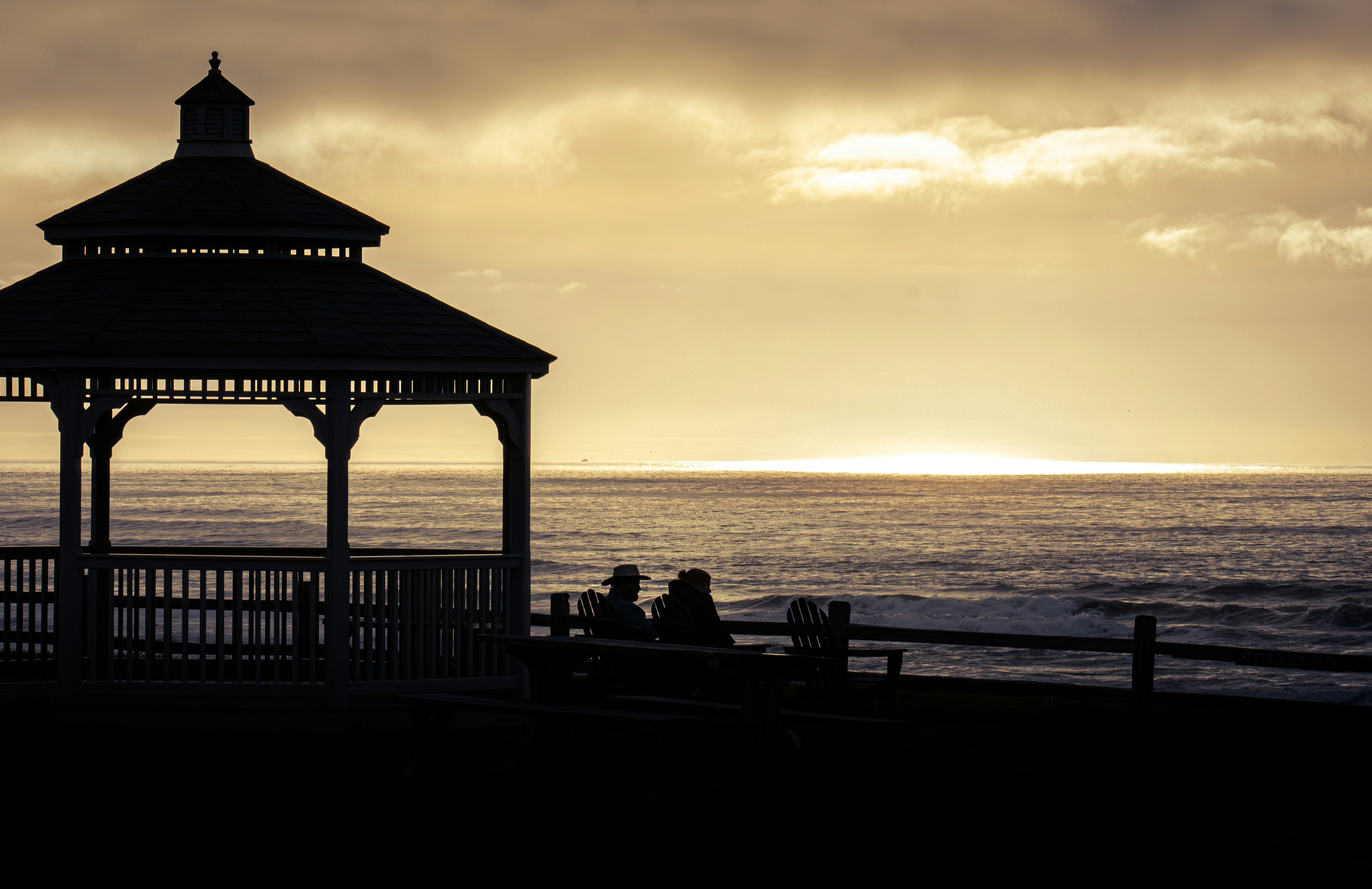 Sunset Silhouette Over the Pier Pavilion