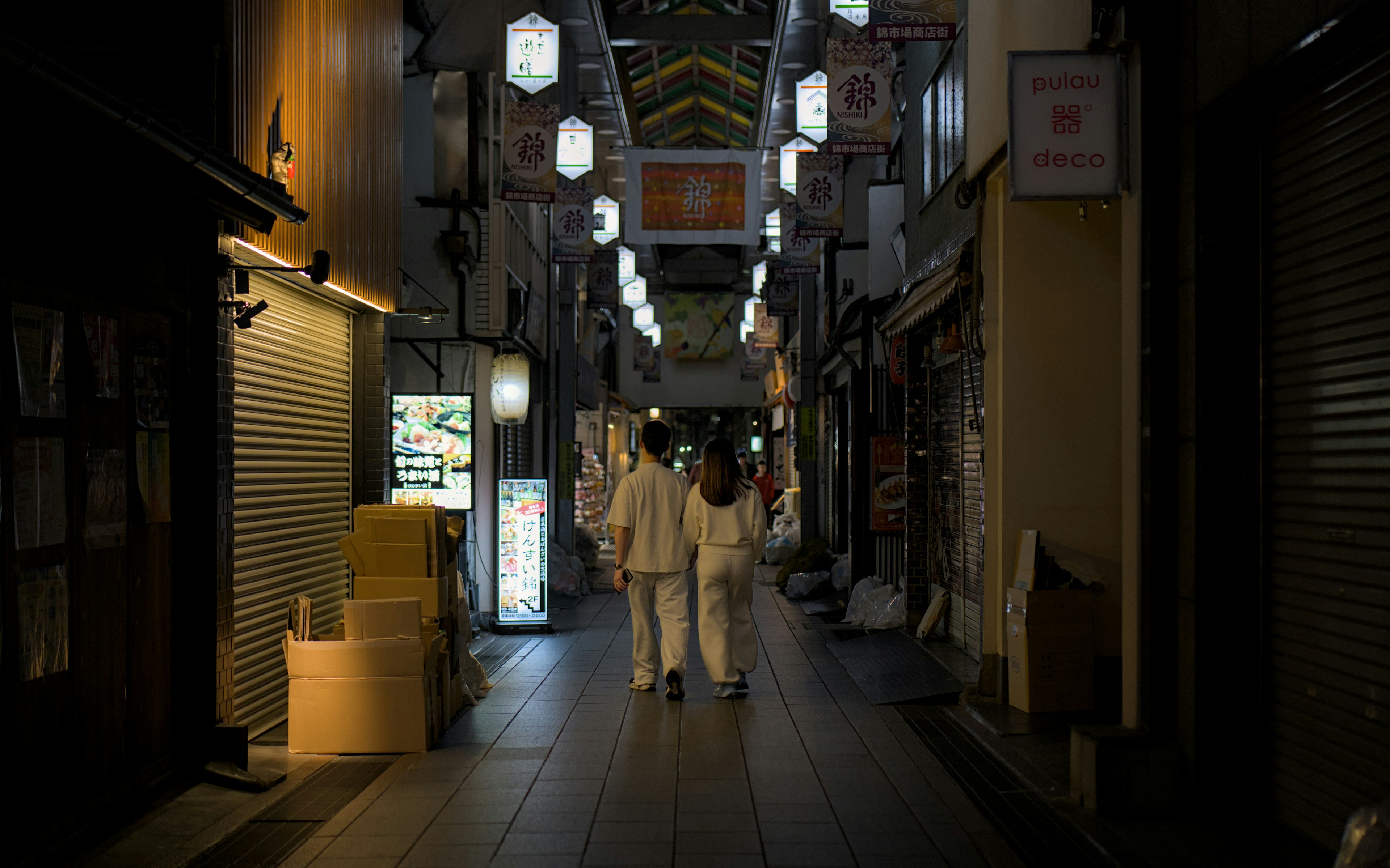 Quiet Walk Through a Neon-Glow Alley