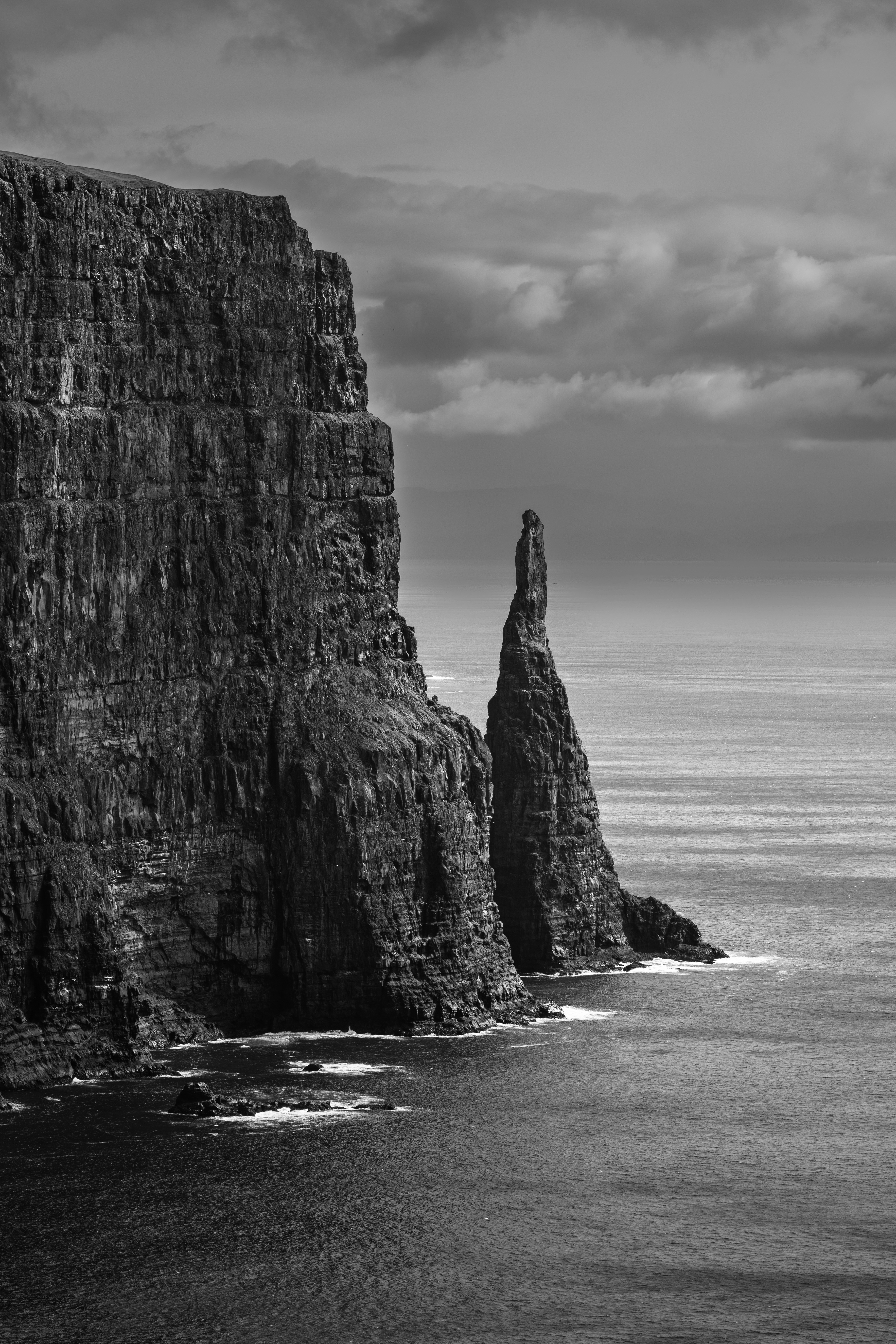 Cliff Citadel: A Sea-Sprayed Pinnacle Standing Against the Horizon