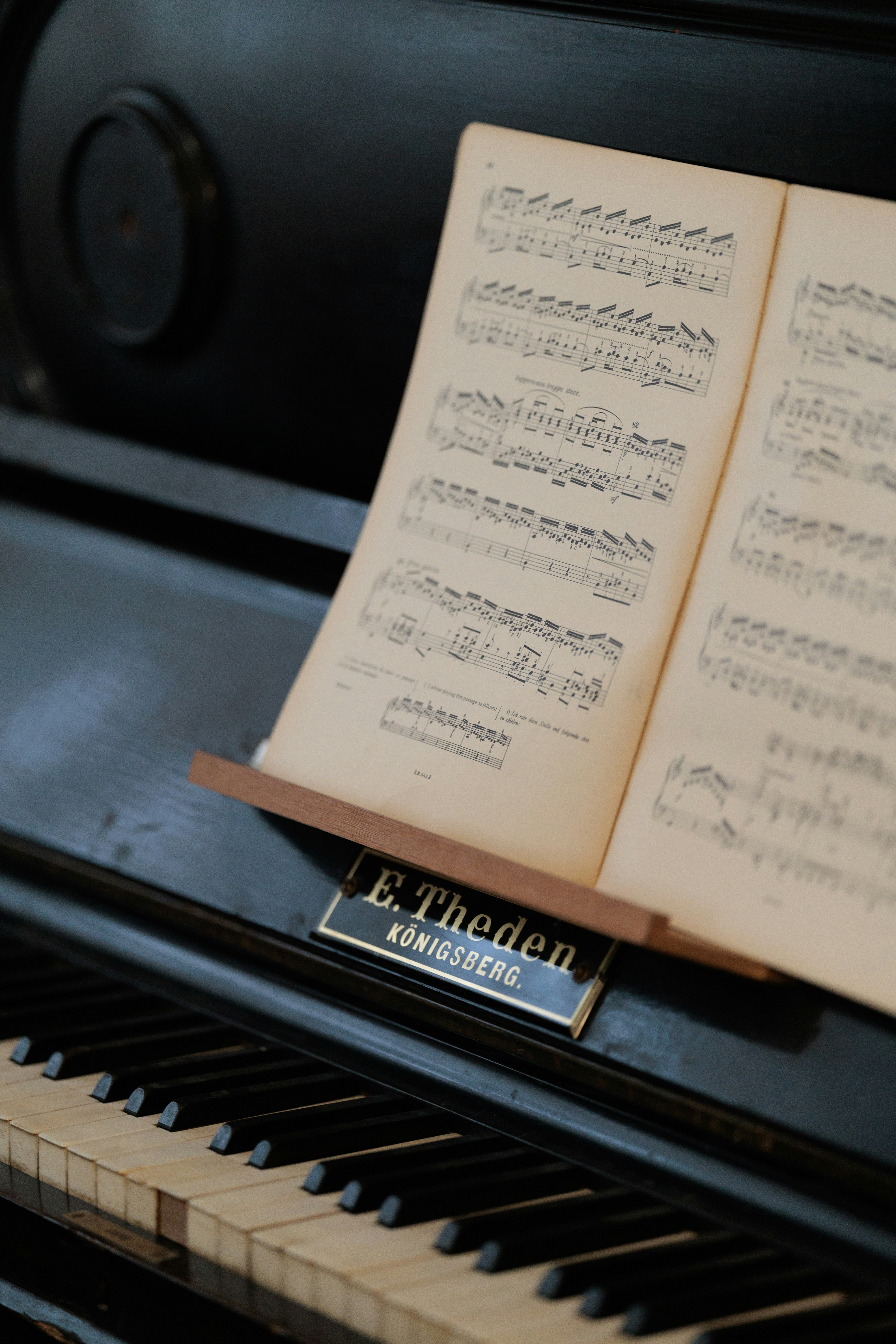 Sheet music rests on an old piano keyboard photo – Free Retro Image on ...