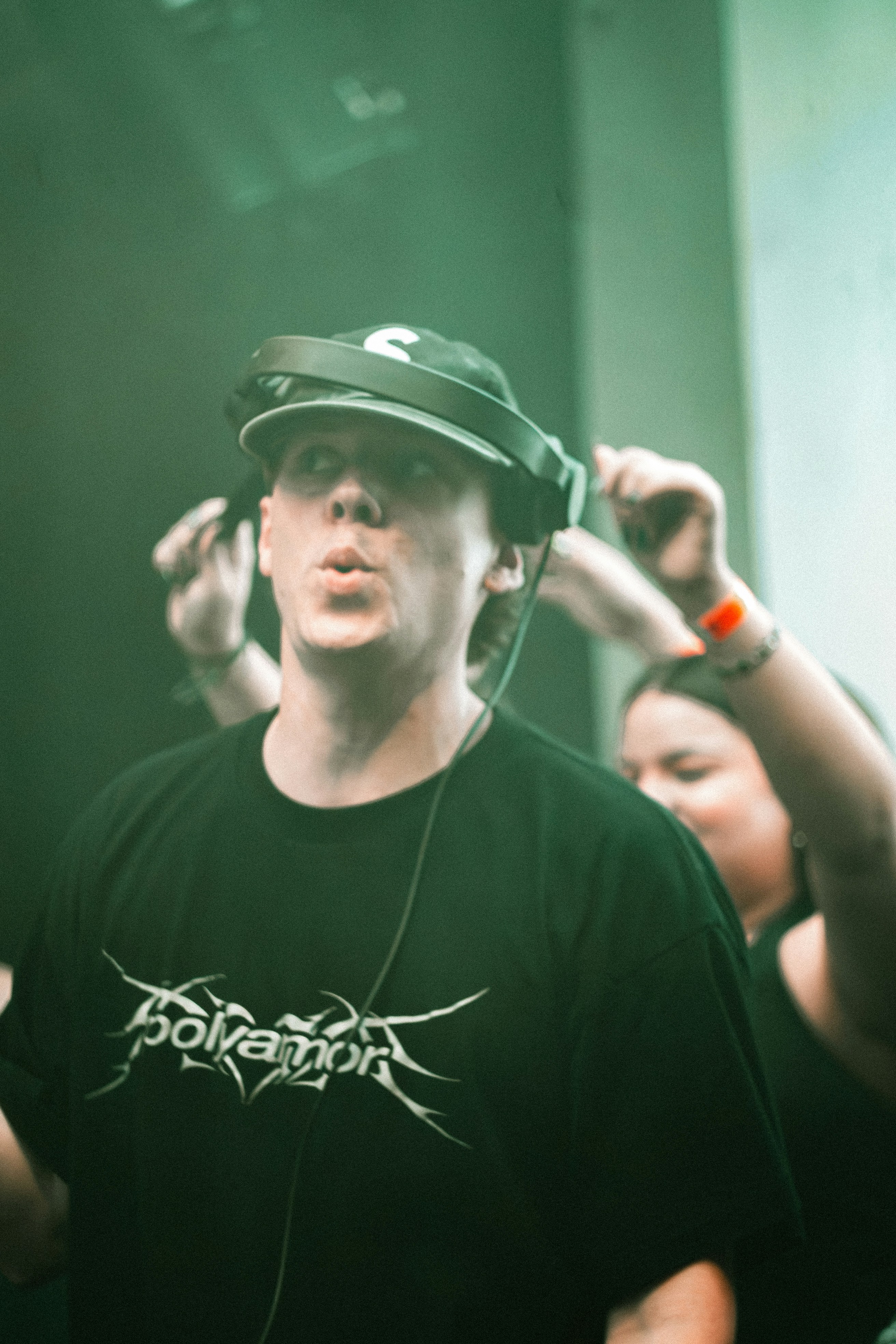 DJ at the Deck: A Live Moment with Focused Expression
