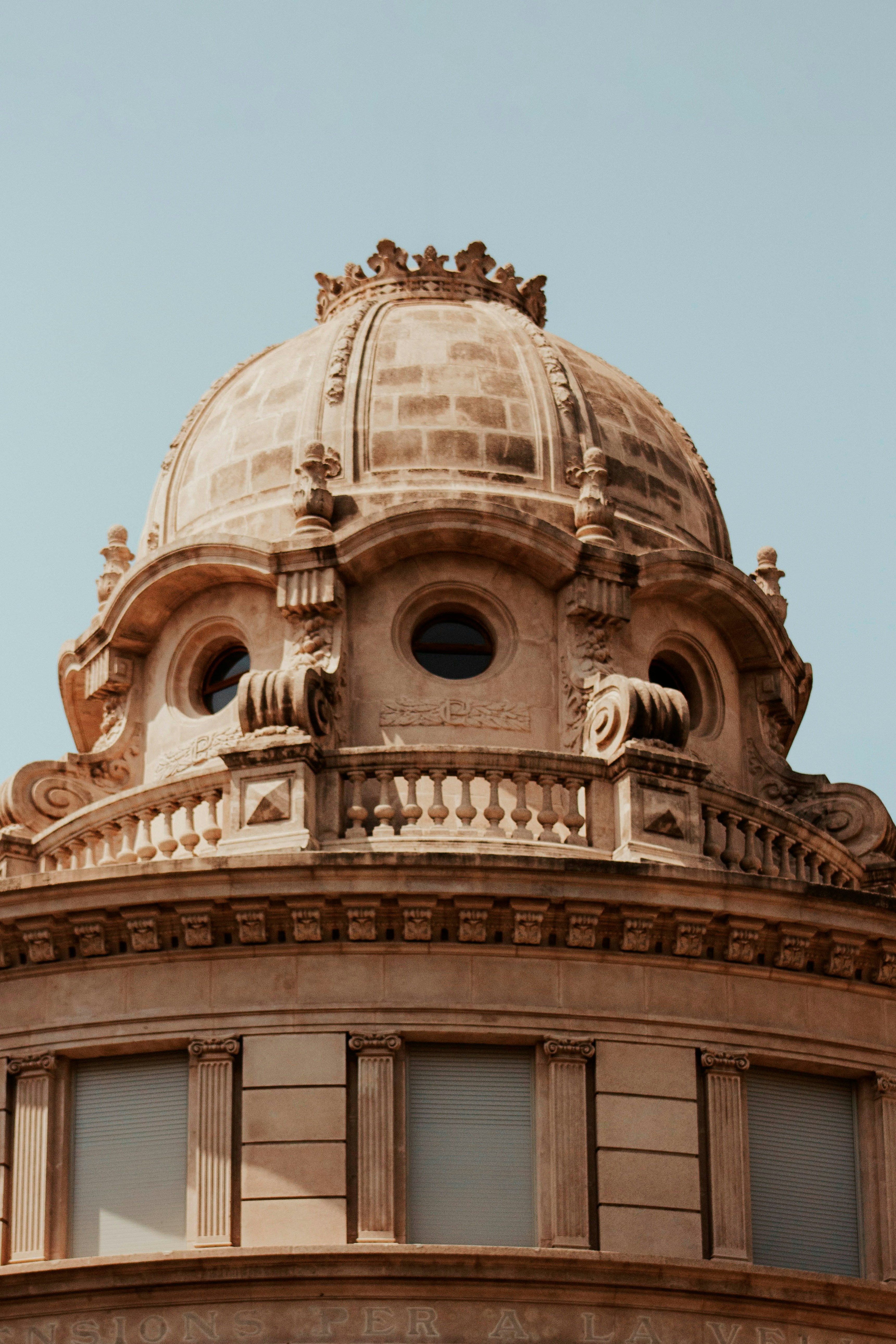 Ornate dome structure with circular windows against sky photo – Free ...