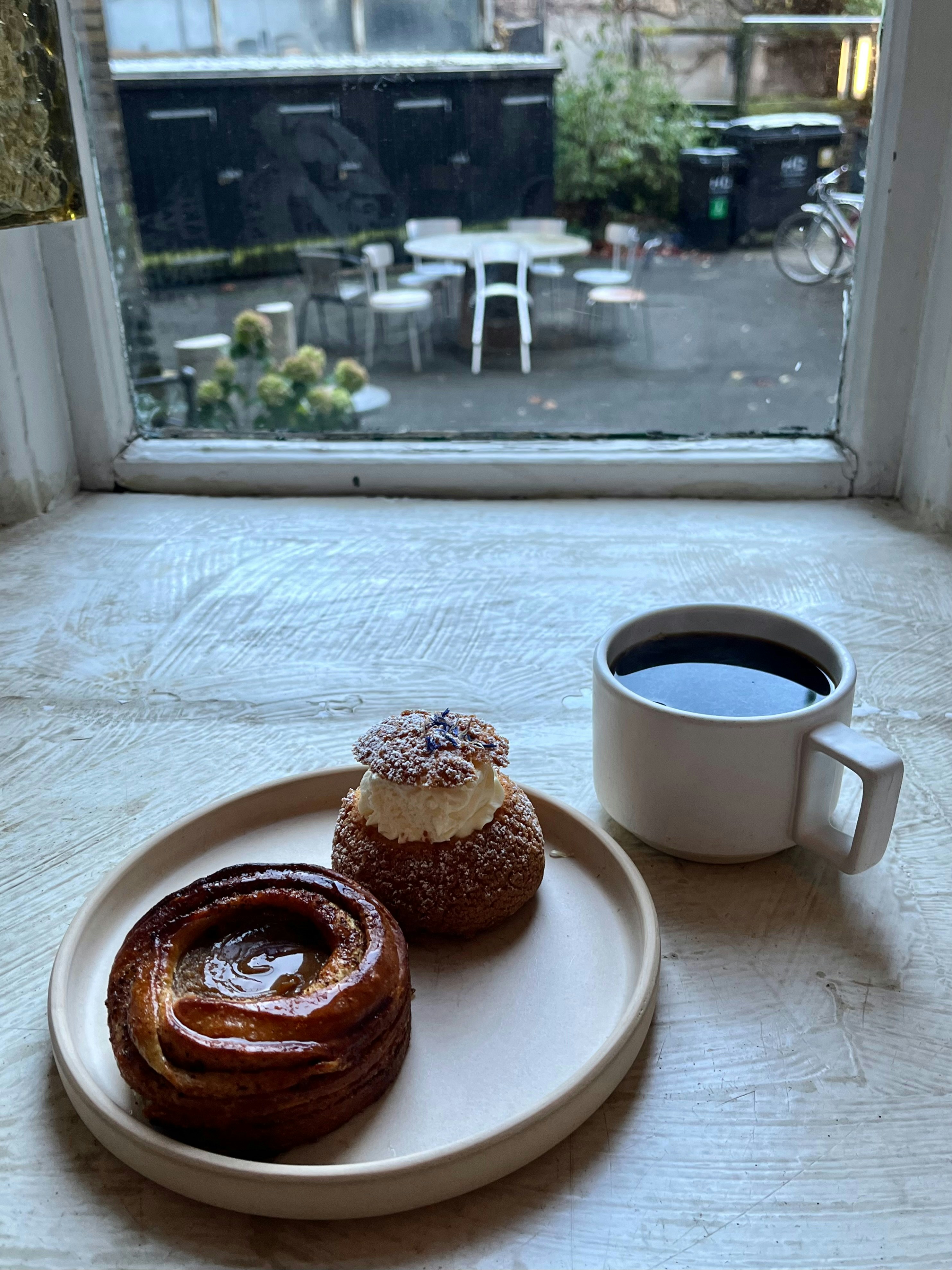 Cafe Window Treats: Cinnamon Swirl and Espresso on a Quiet Morning
