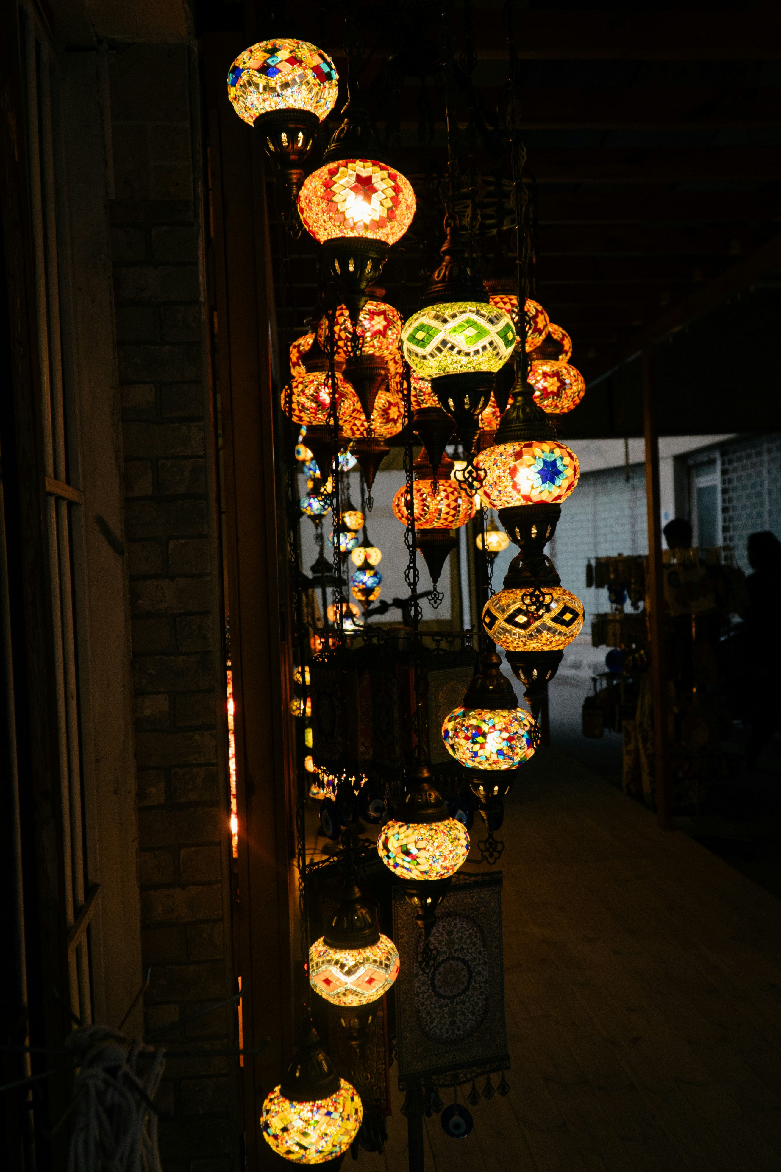 Loft of Light: Mosaic Lanterns in a Dim Corridor