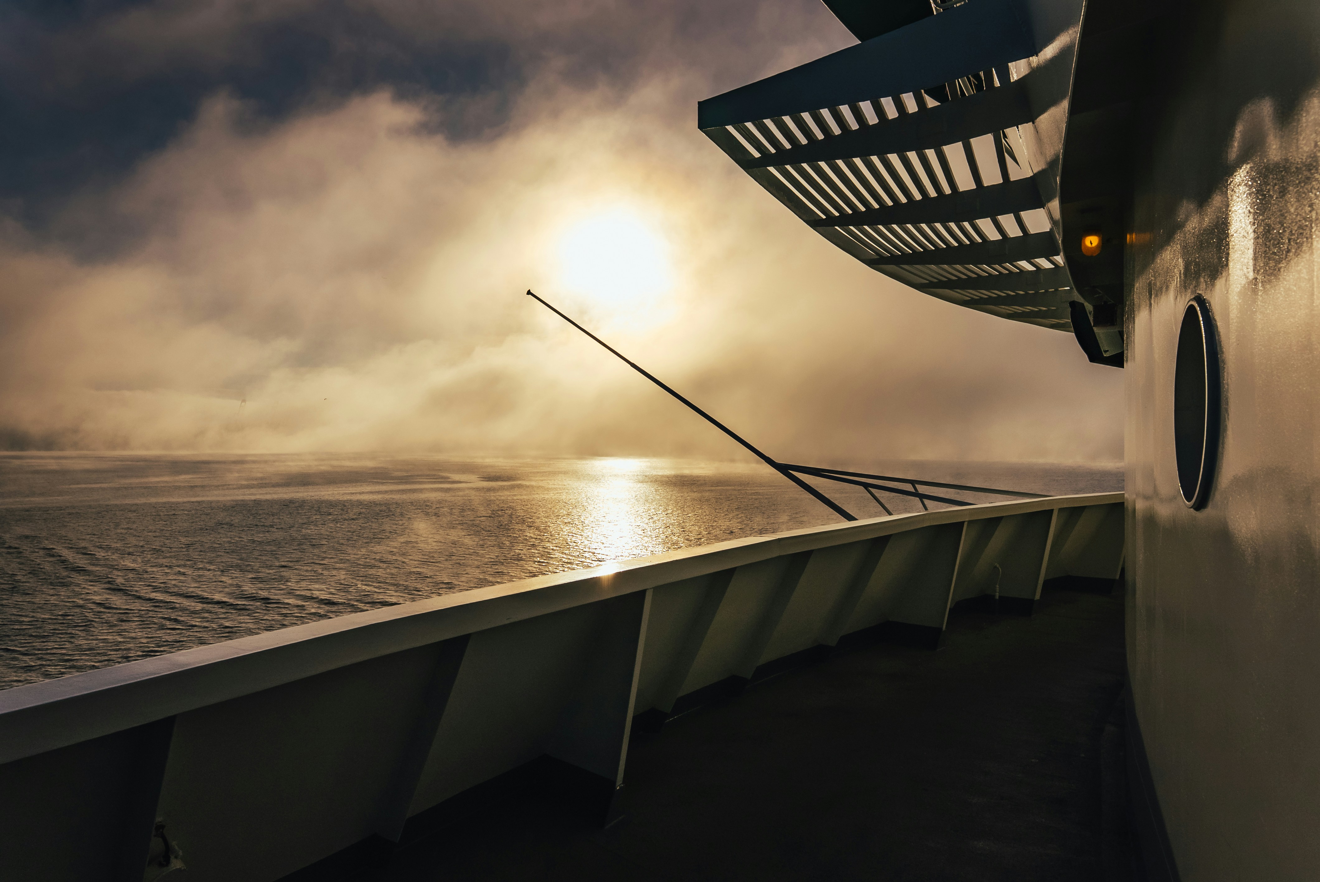 Sunlit Horizon Aboard: A Quiet Moment on the Vessel