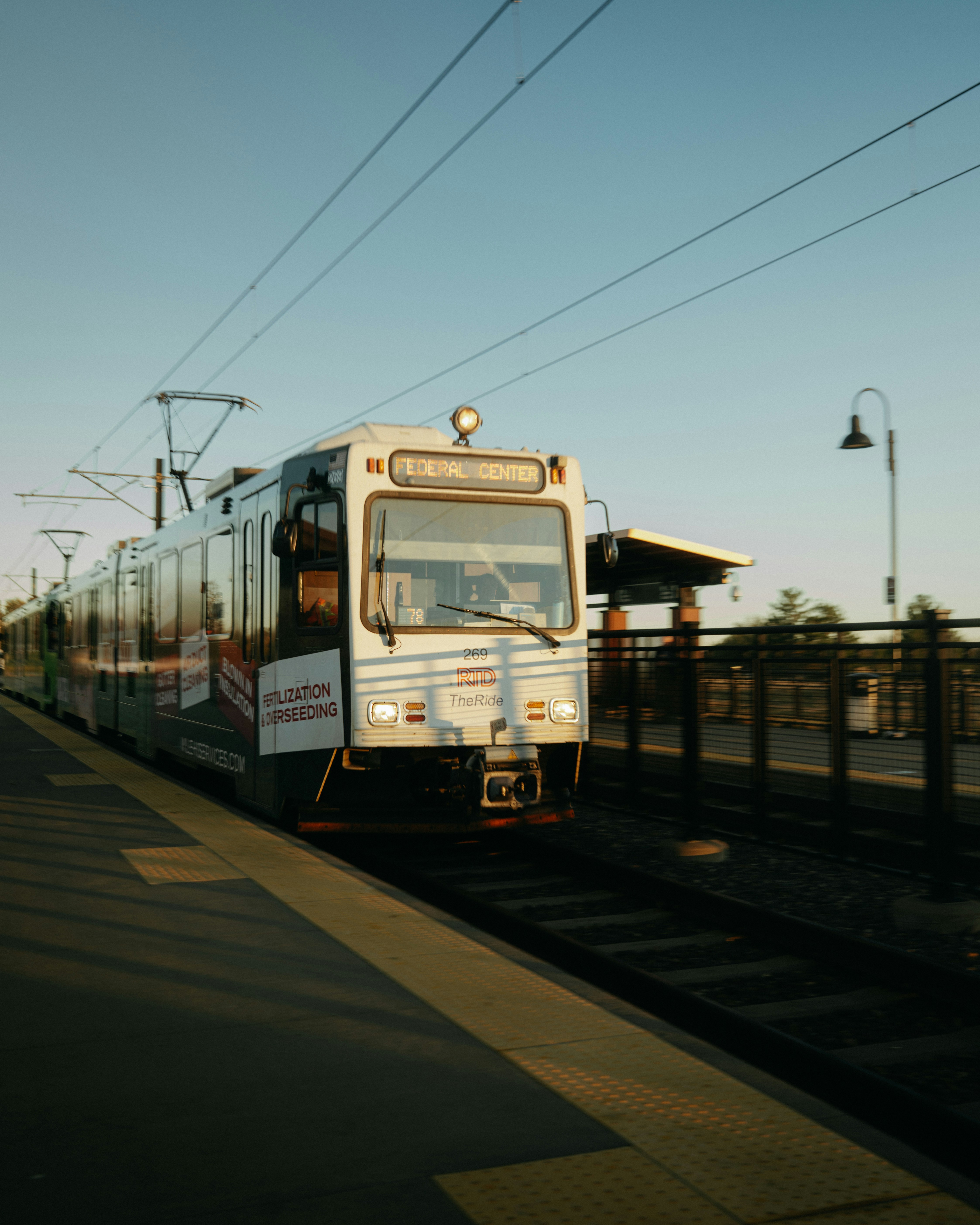 Morning Commuter: A Forward-Facing Train at Quiet Platform