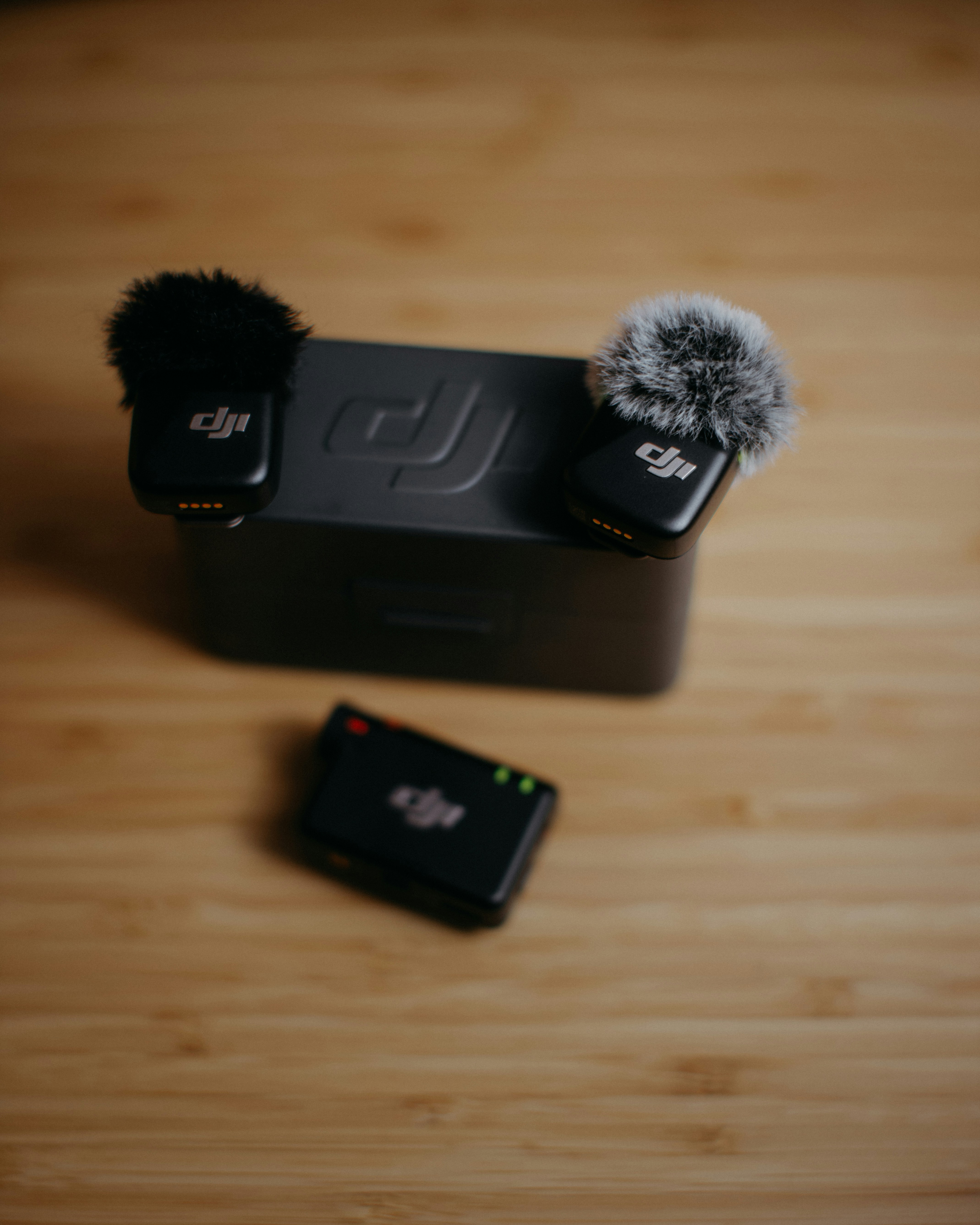 Dual Wireless Microphones on a Brand-Stamped Charger