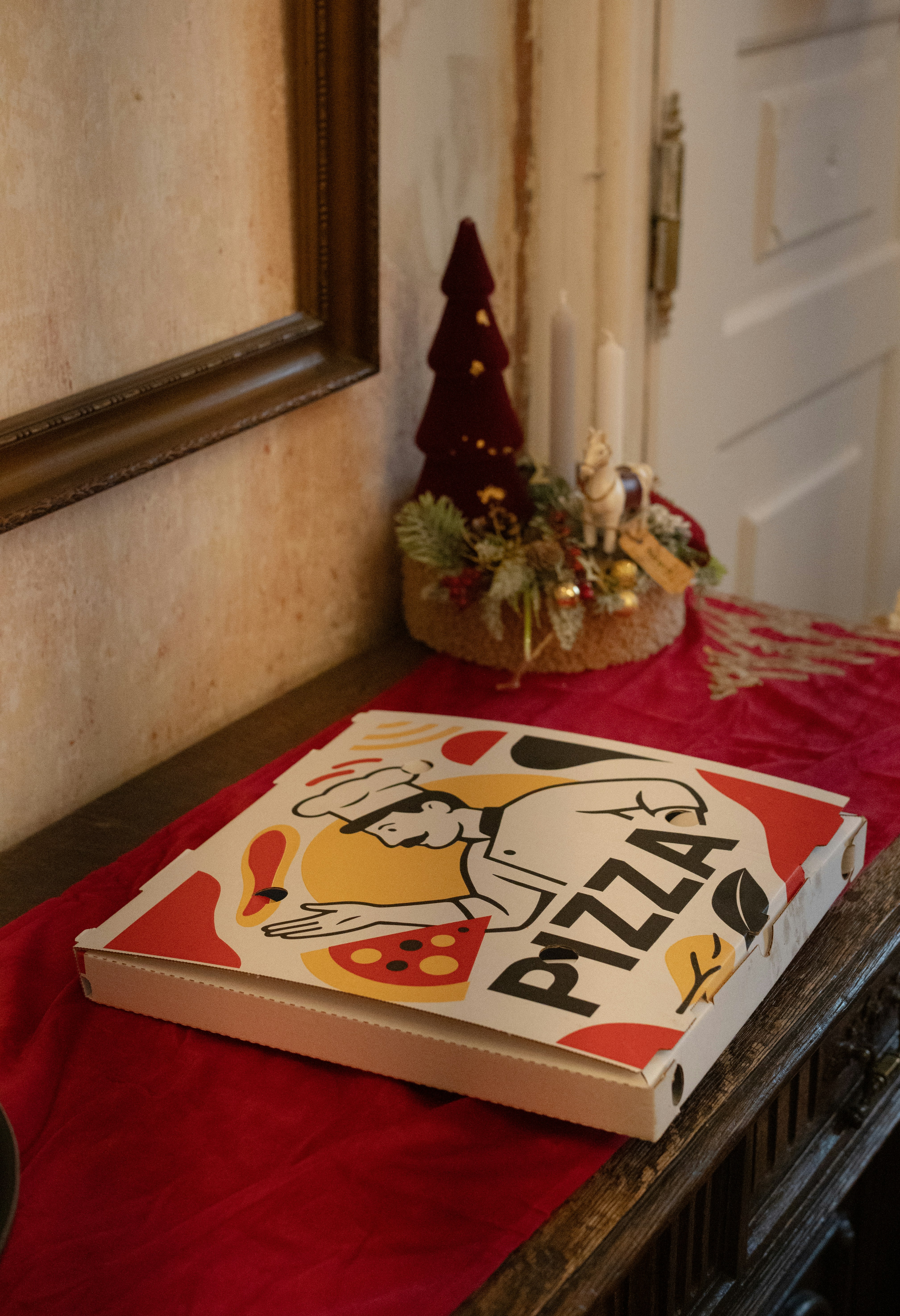 Pizza on a Red Tablecloth: A Warm Holiday Still Life
