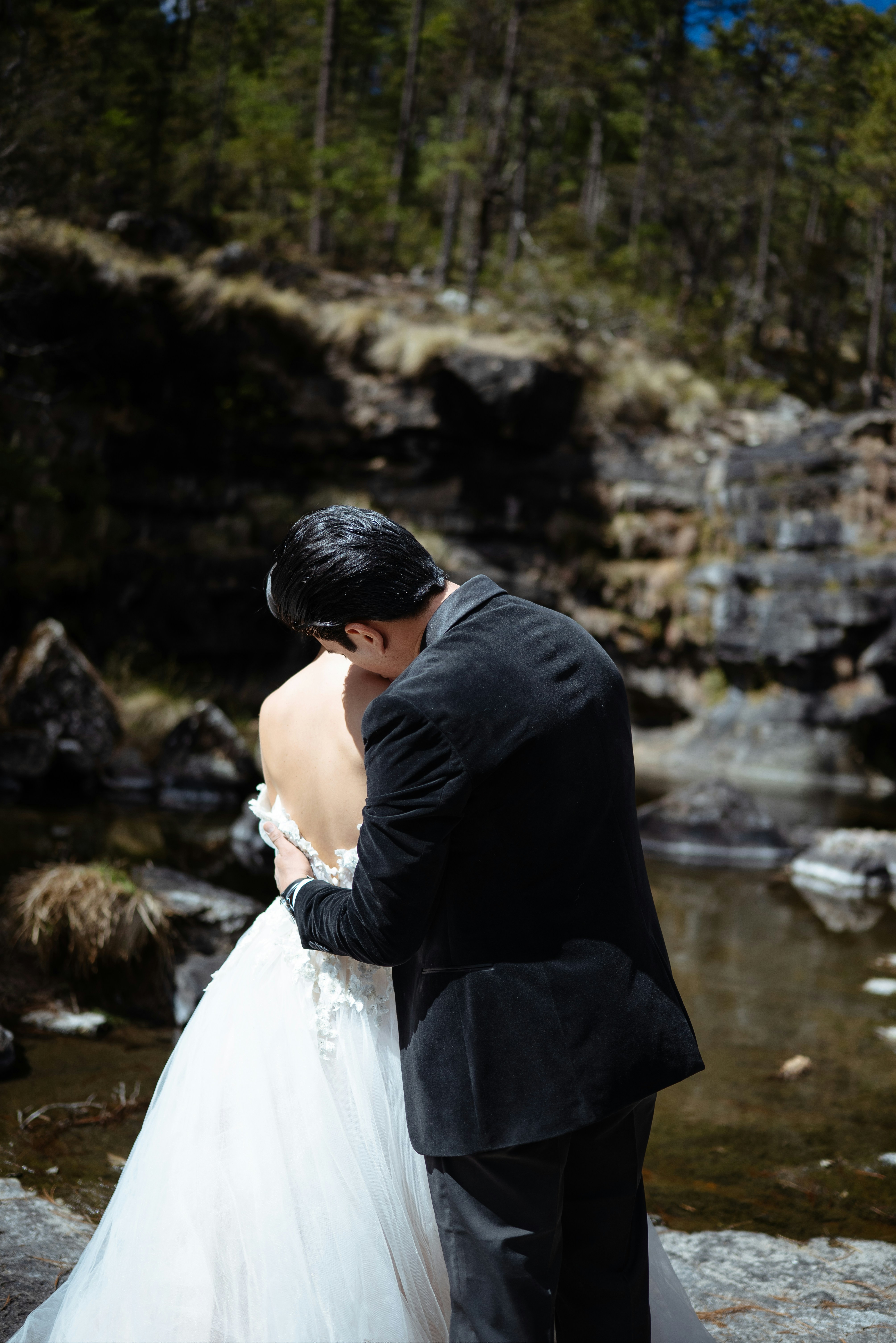 Whispered vows by the forest stream