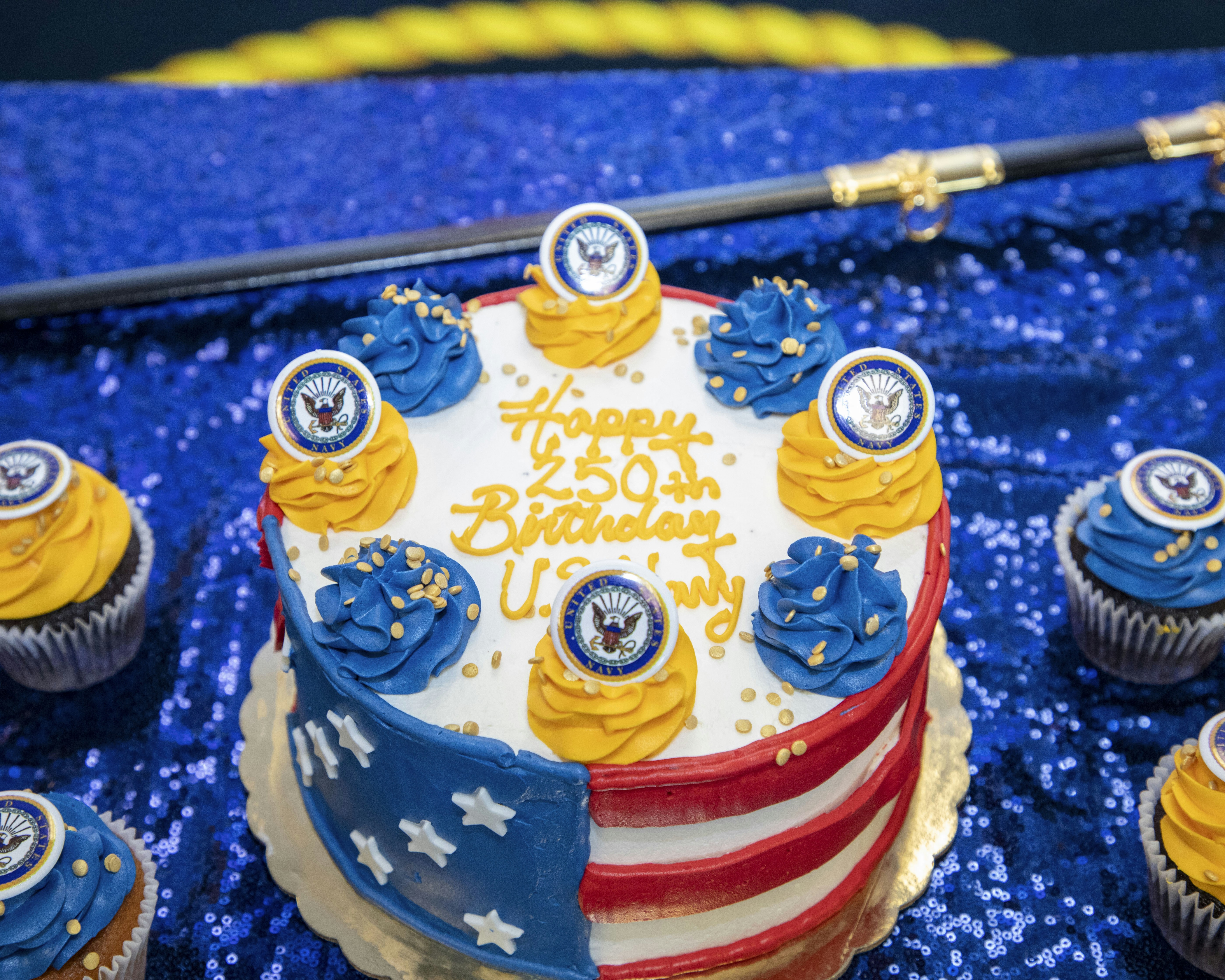 Patriotic Birthday Cake Beneath a Shower of Blue Confetti