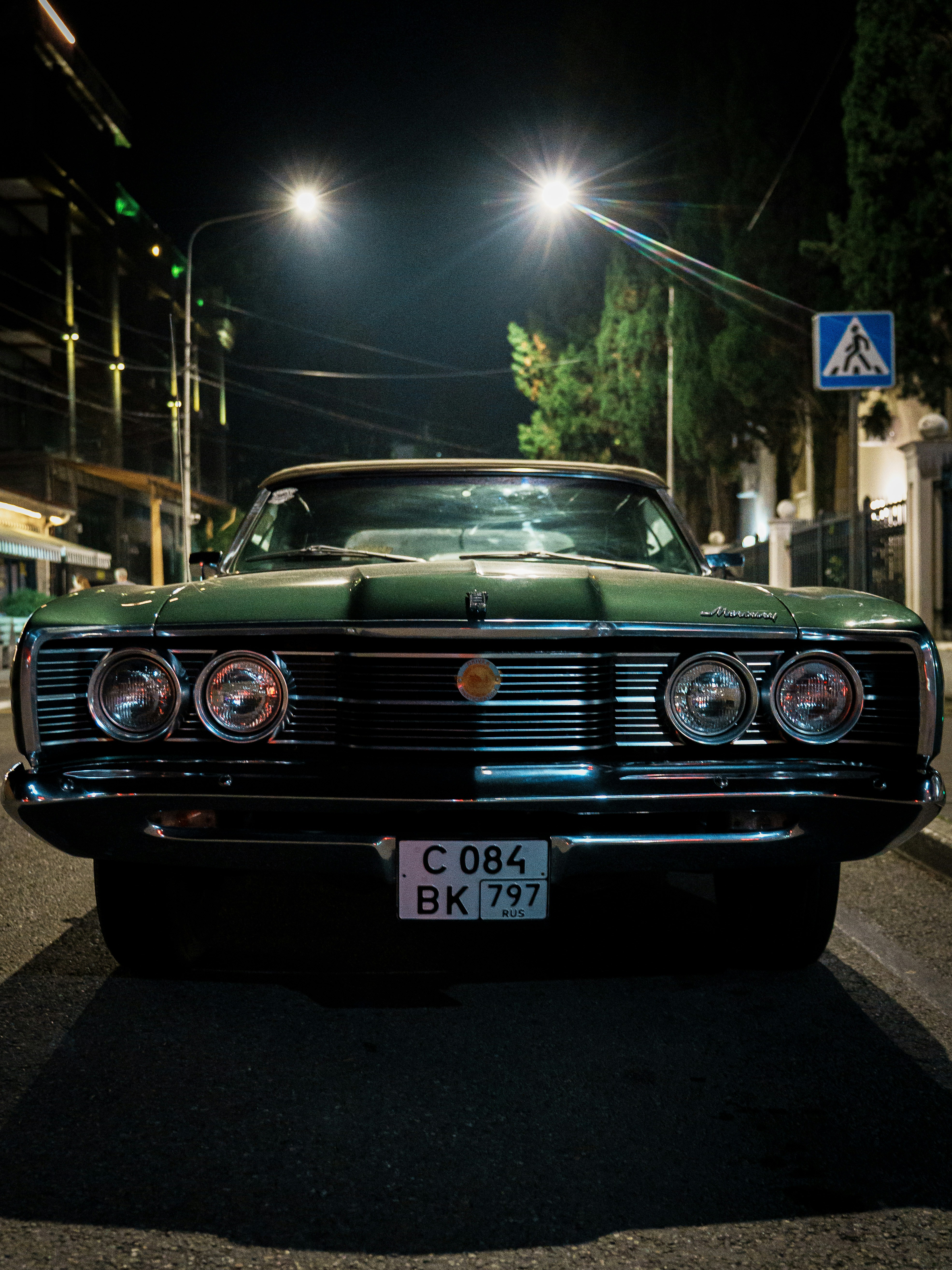 Moonlit Classic: A Green Belle Under Streetlights