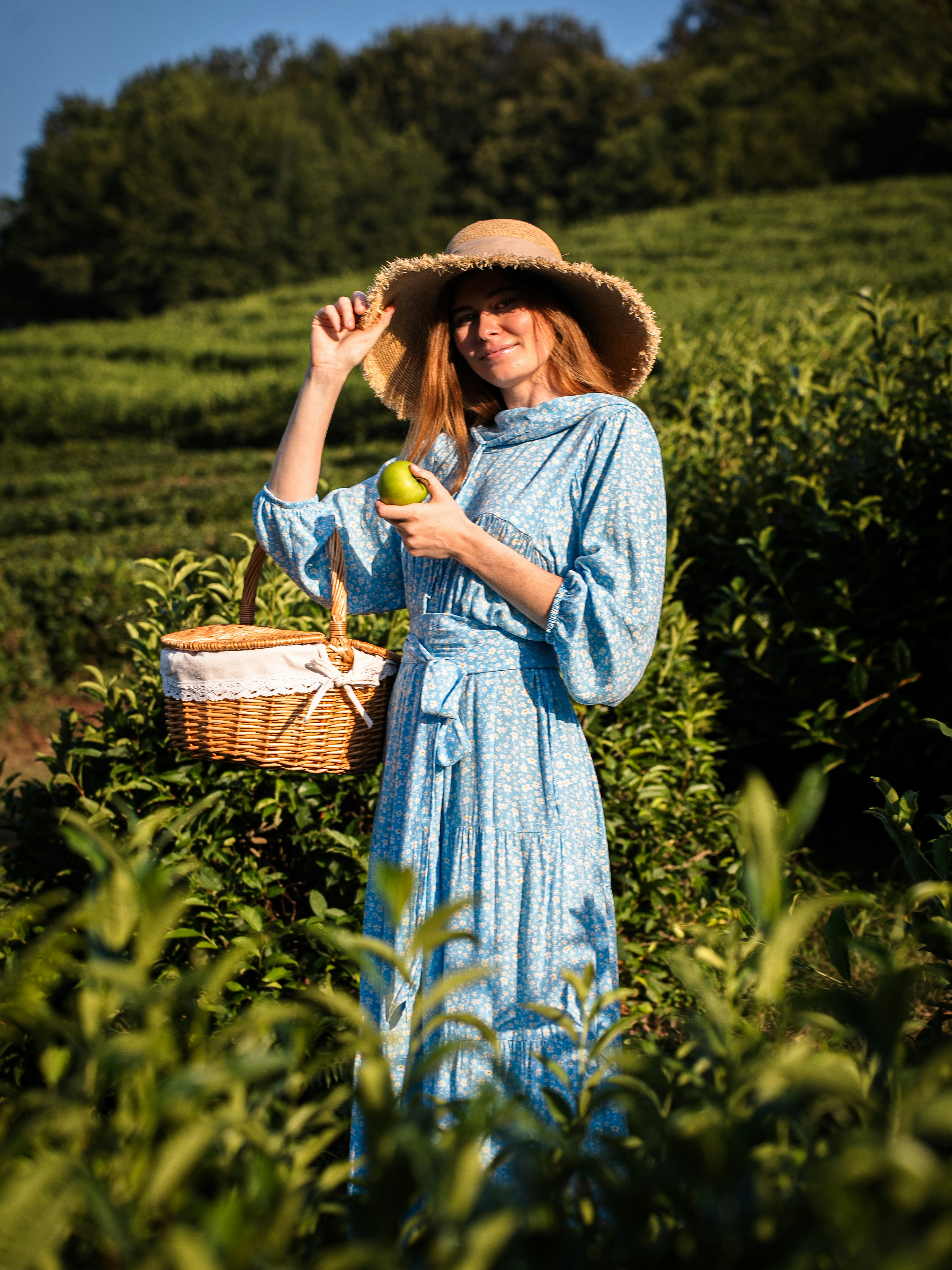 Sunlit Orchard Portrait in a Blue Dress