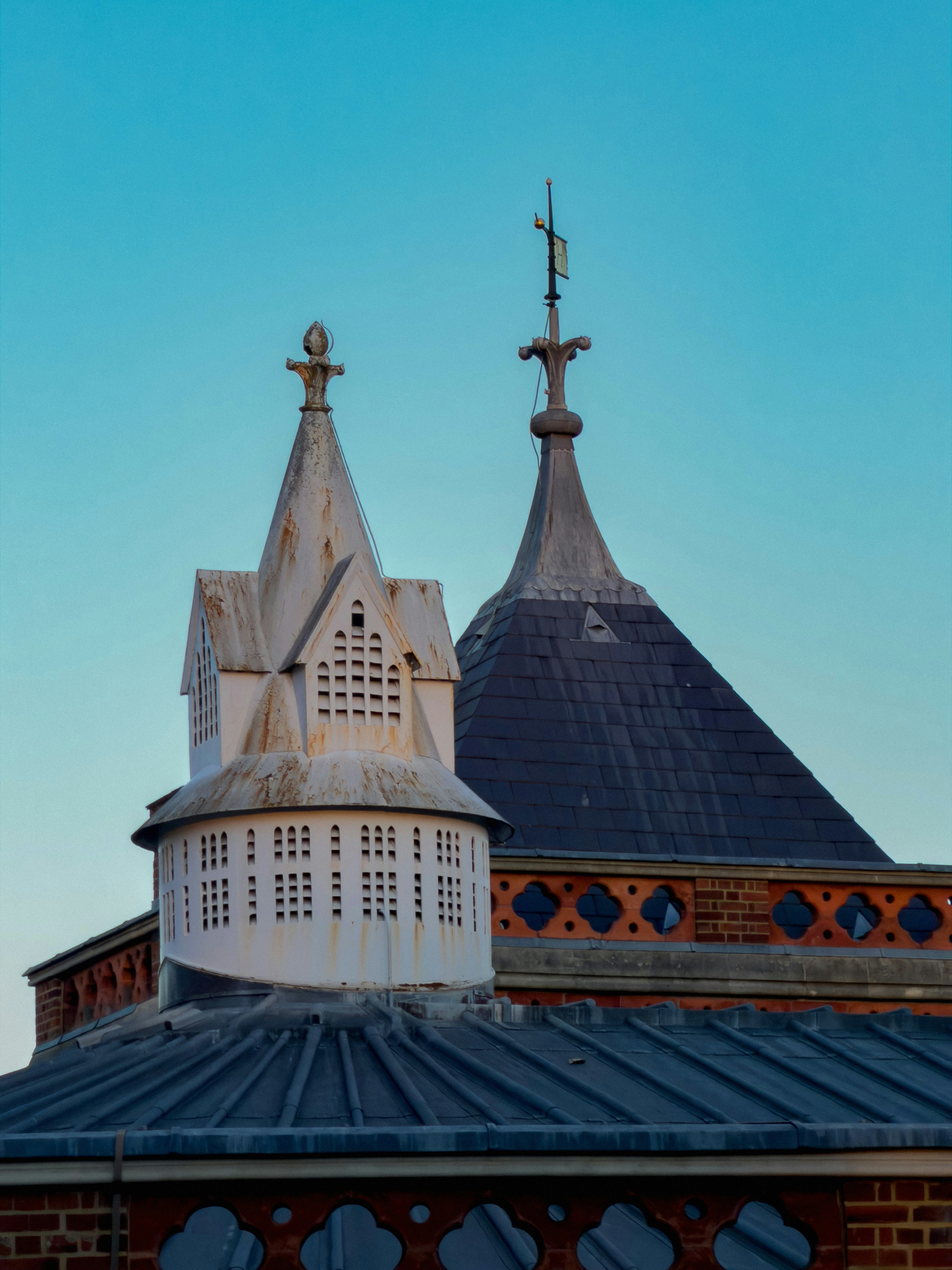 Stone Spire Silhouettes Against a Clear Blue Skyline