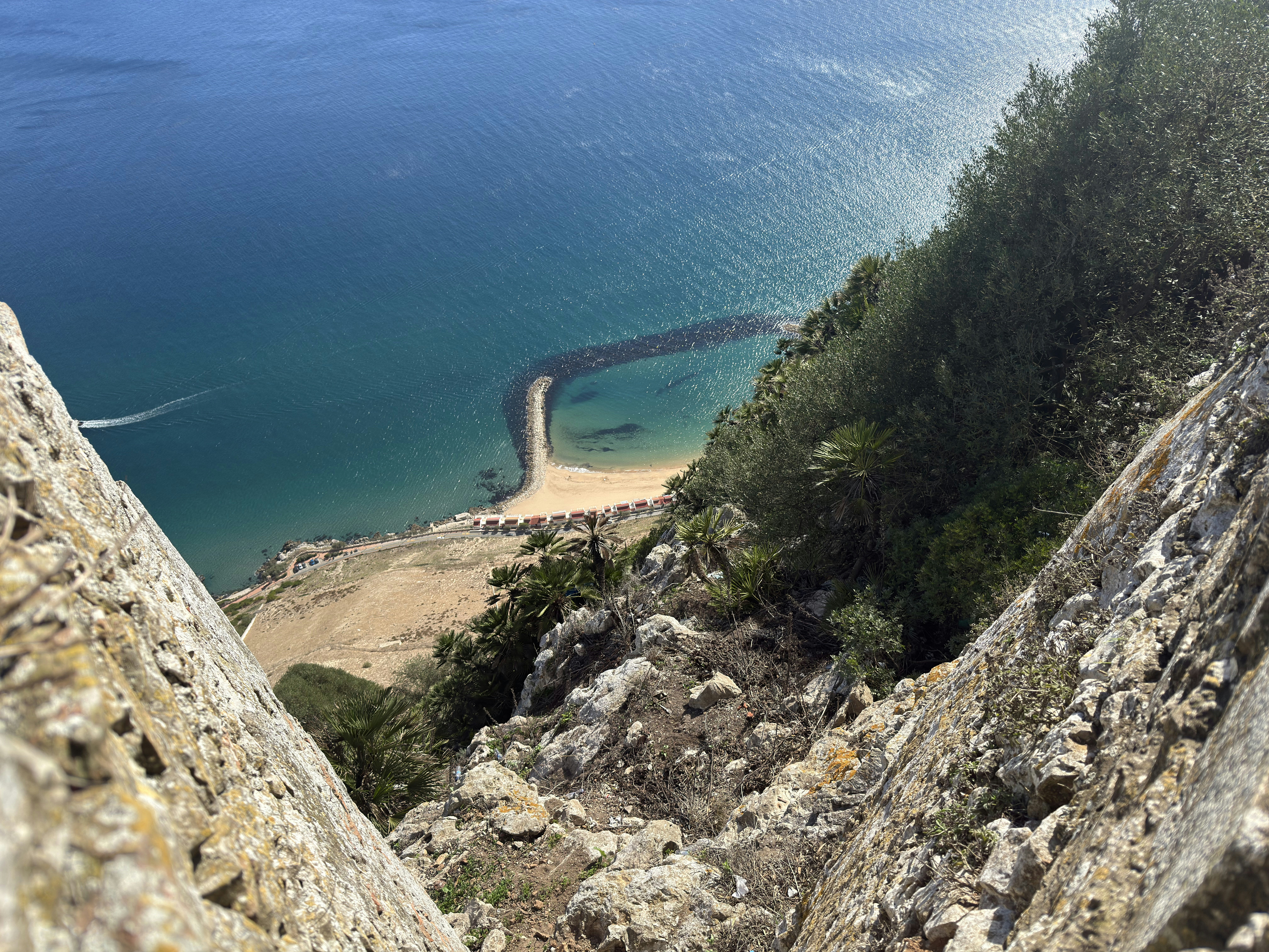Cliff Edge Overlooking a Turquoise Cove