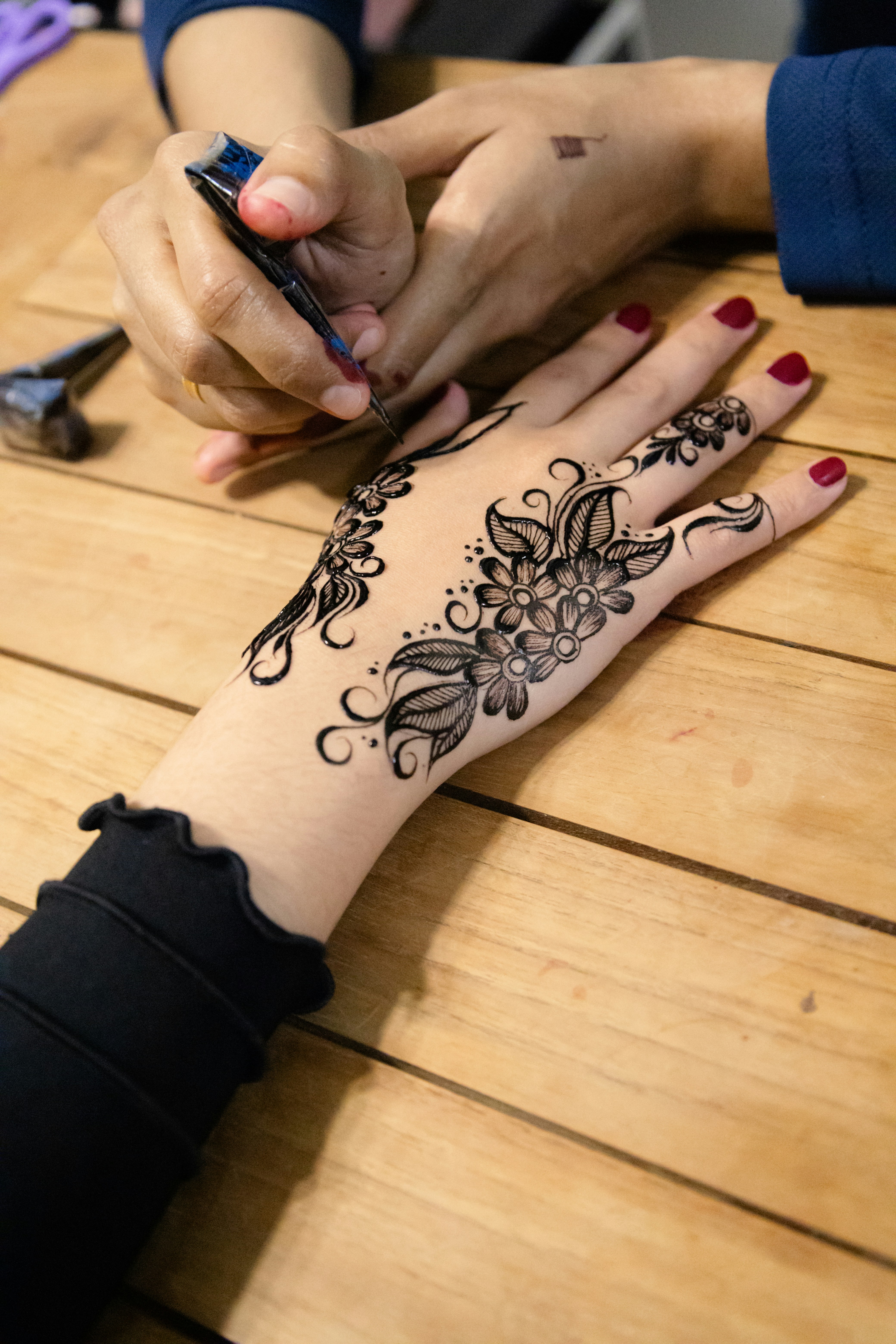 Henna in Bloom: Intricate Floral Studio Hand Tattooing