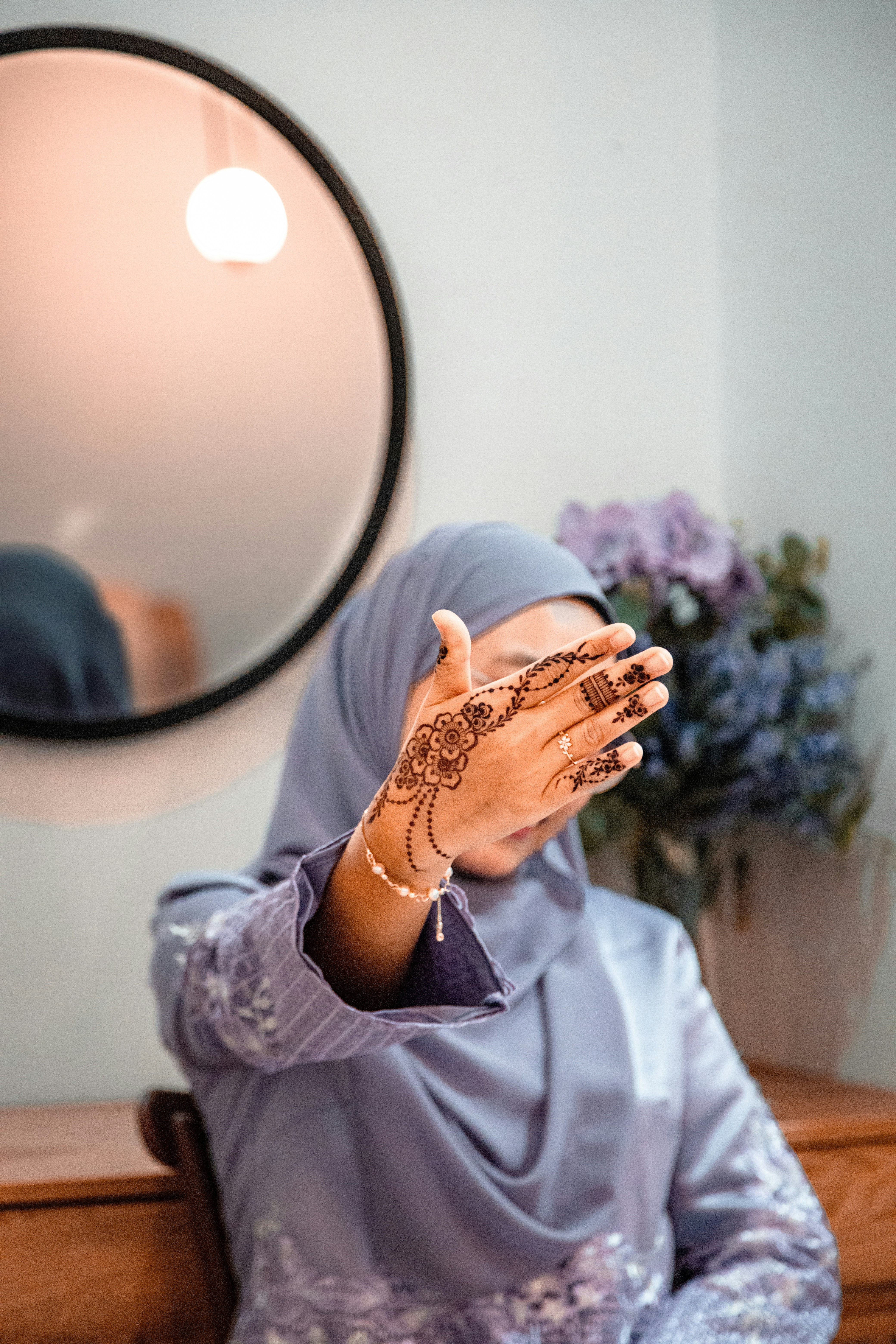 Hennaed Hands in Soft Light: A Moment of Quiet Reflection