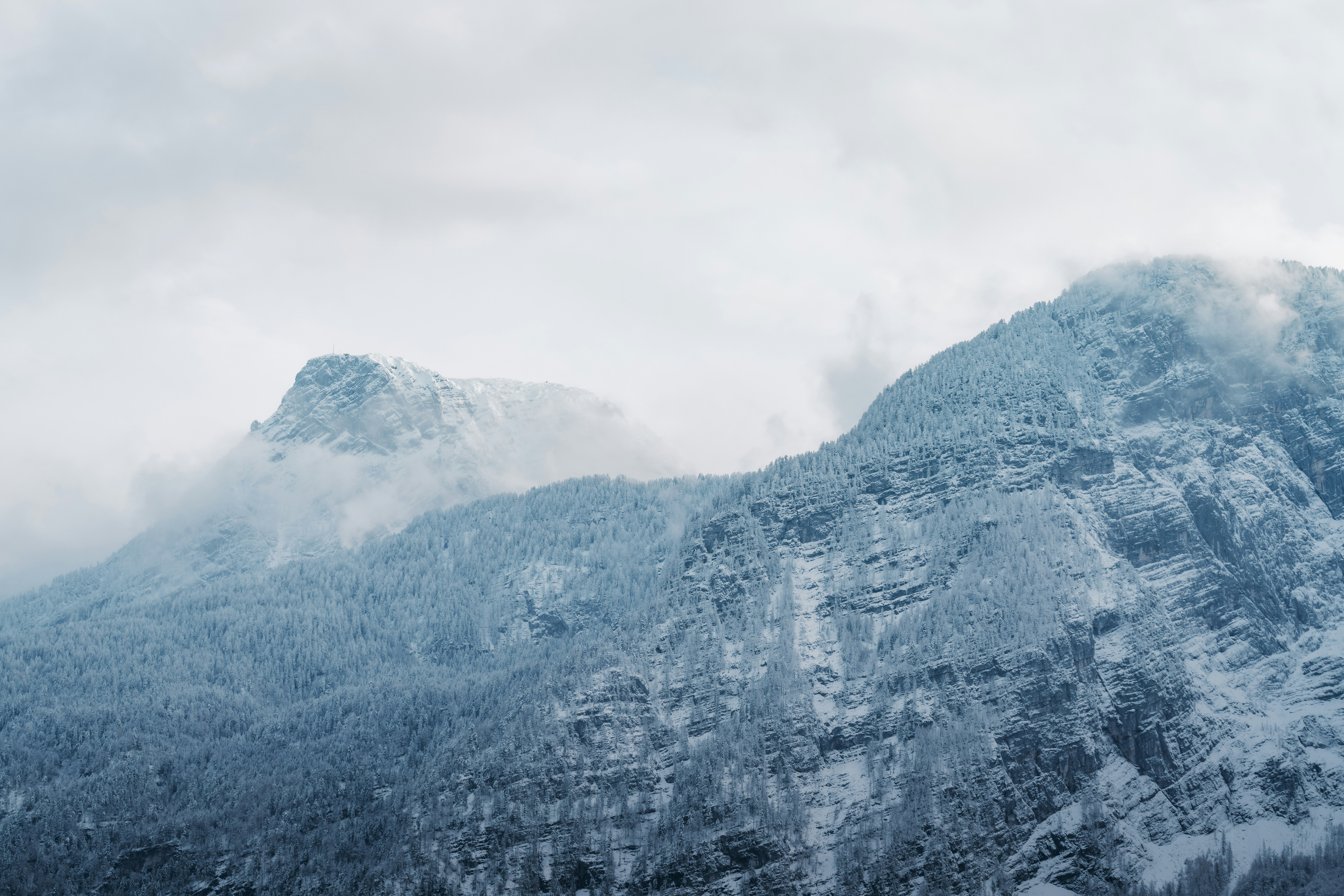 Cloudy Skies Over Icy Mountains