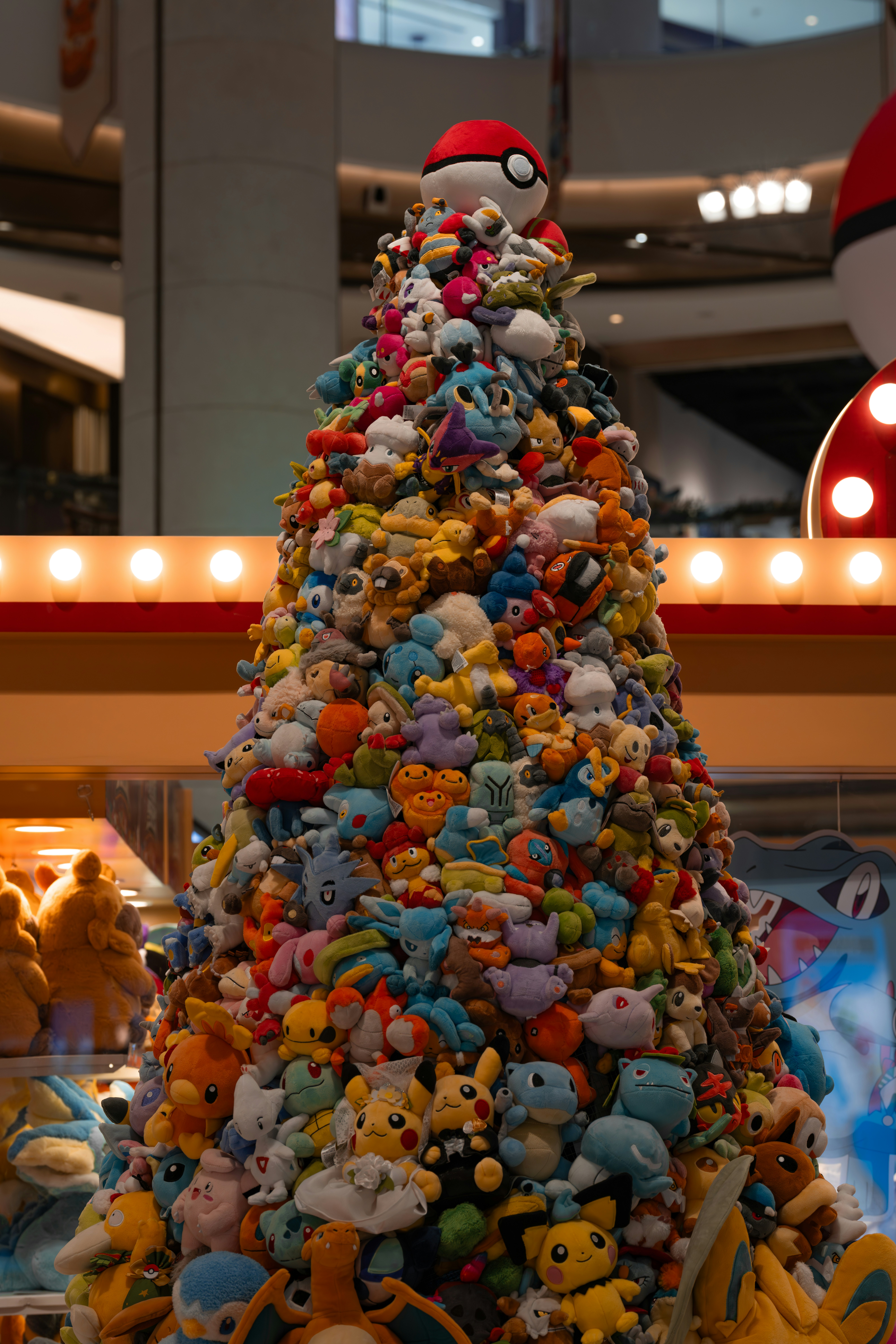 Tower of stuffed pokémon toys with poké ball on top. photo – Free Anime ...