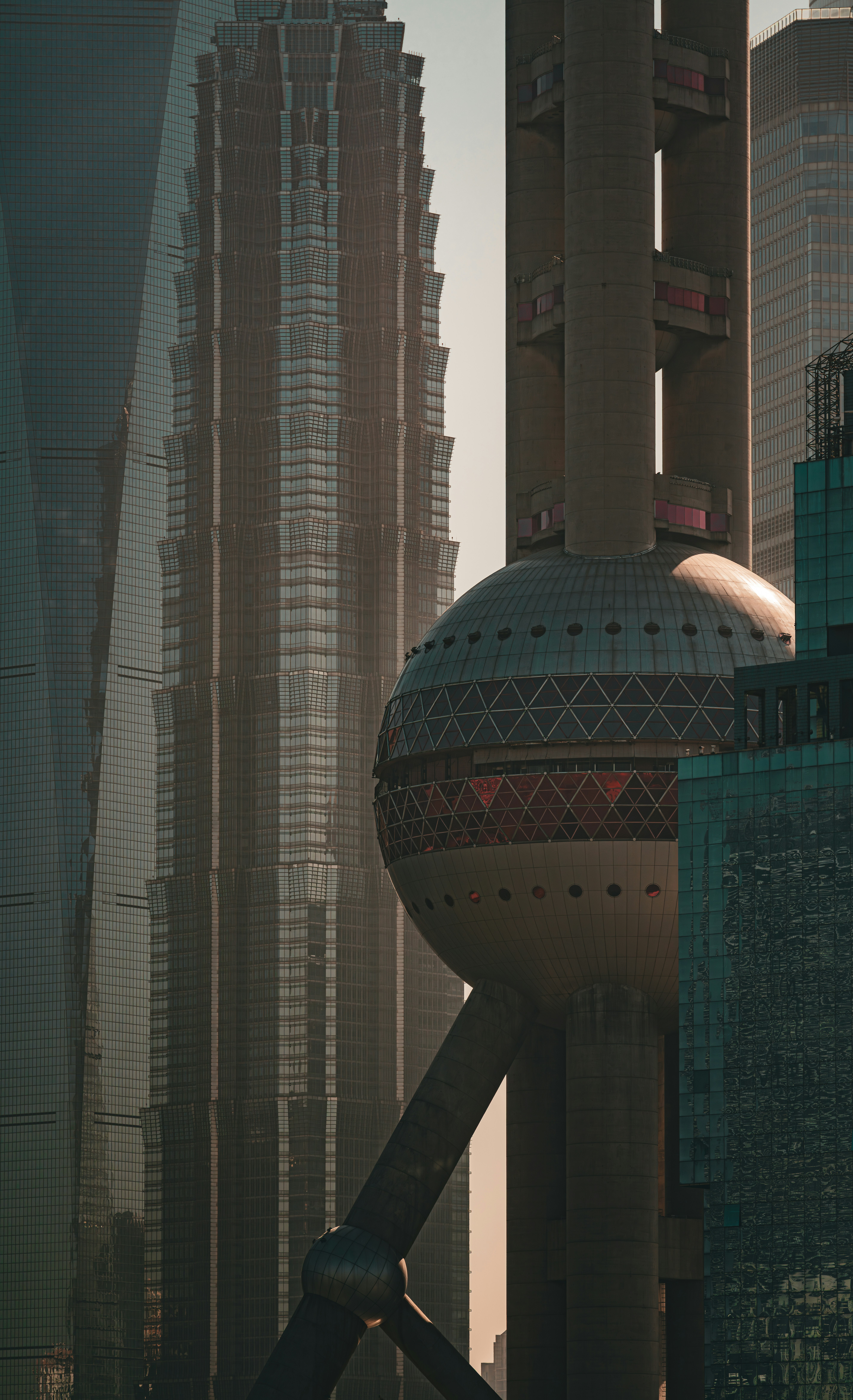 Architectural Colossus Pierced by Steel Spheres