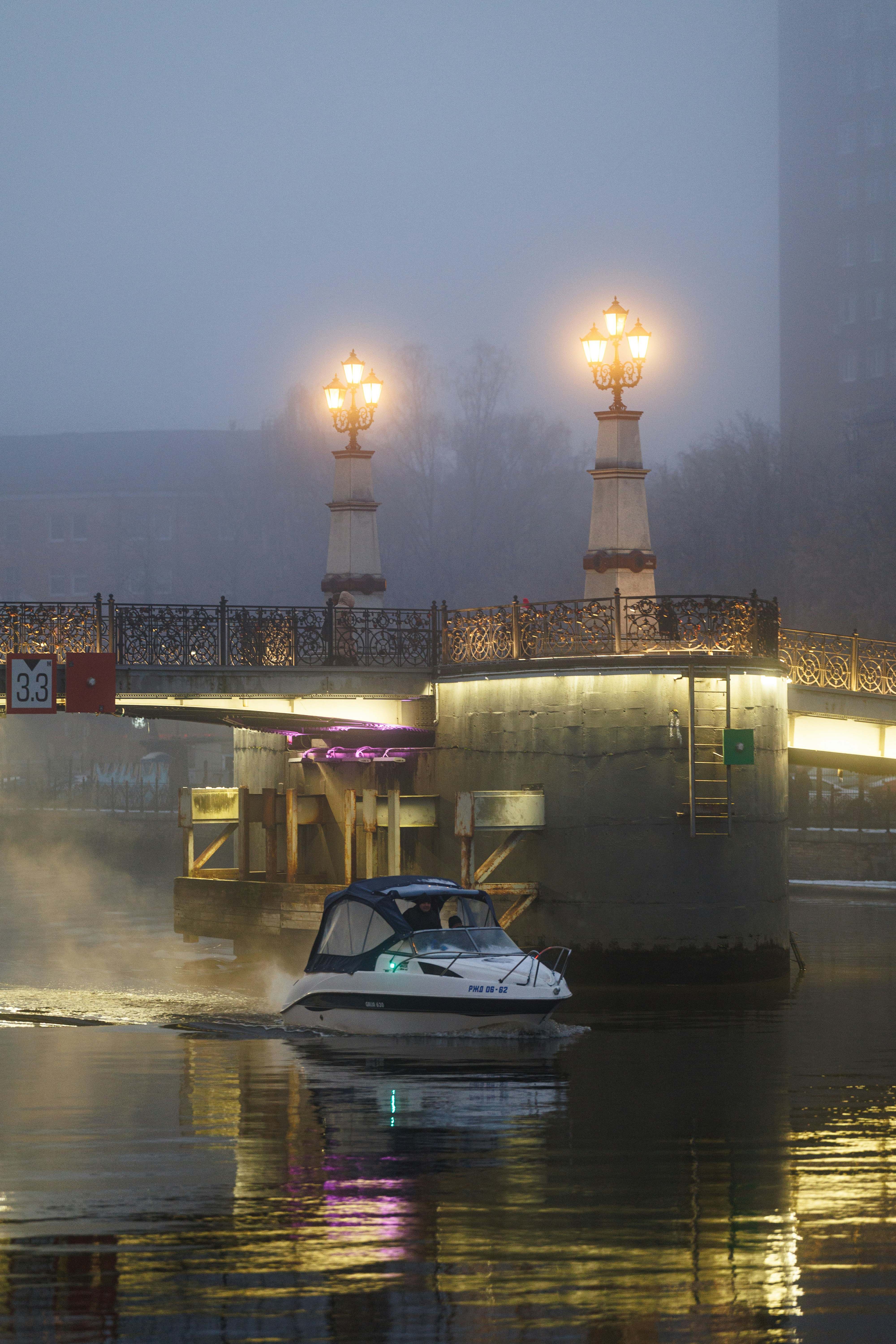 Mist over the Marina: A Boat Silk in the Glow