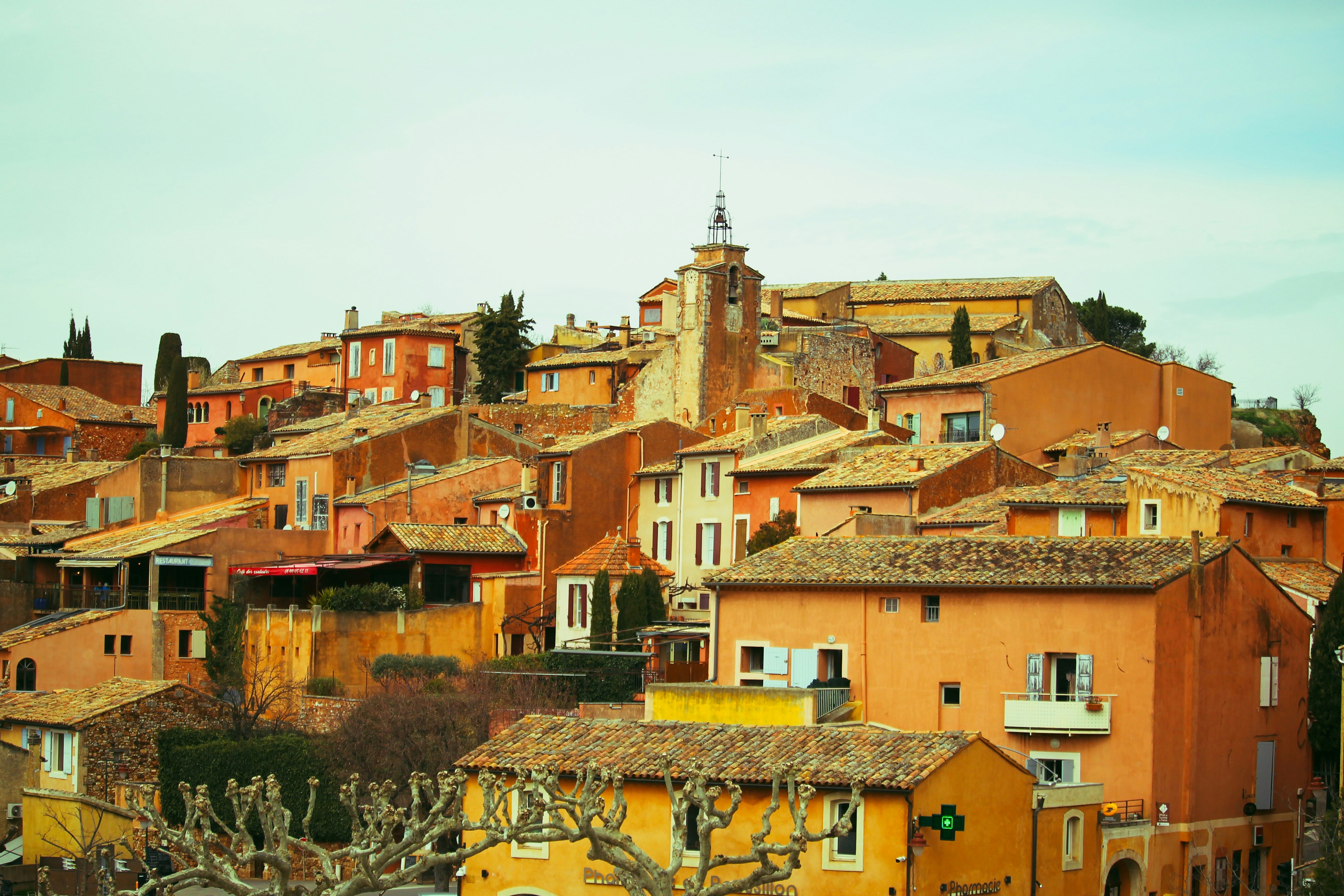Terracotta Seaside Village: A Sunlit Rooftop Mosaic