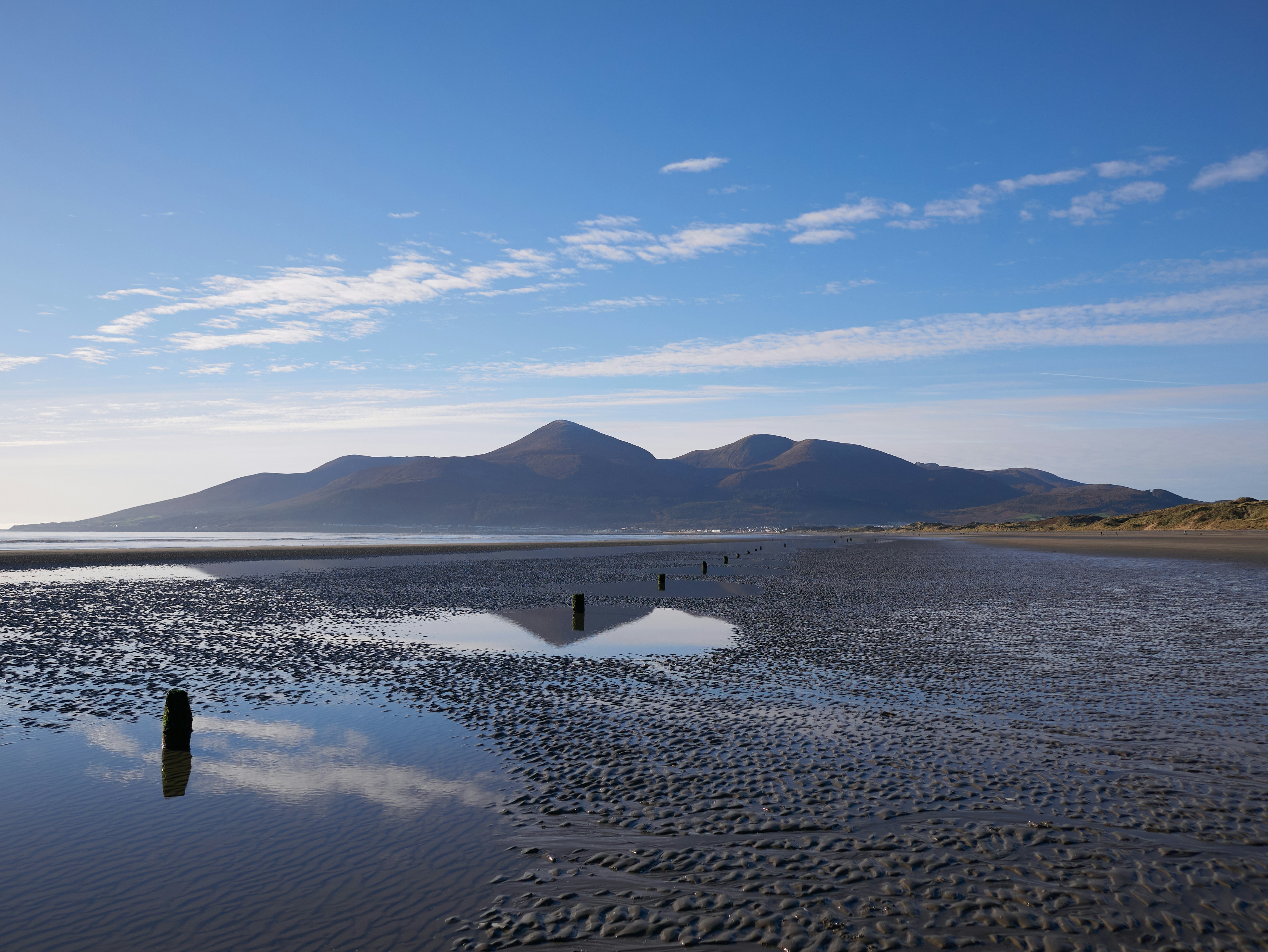 Distant Dunes and Tidal Flats Under a Cerulean Sky