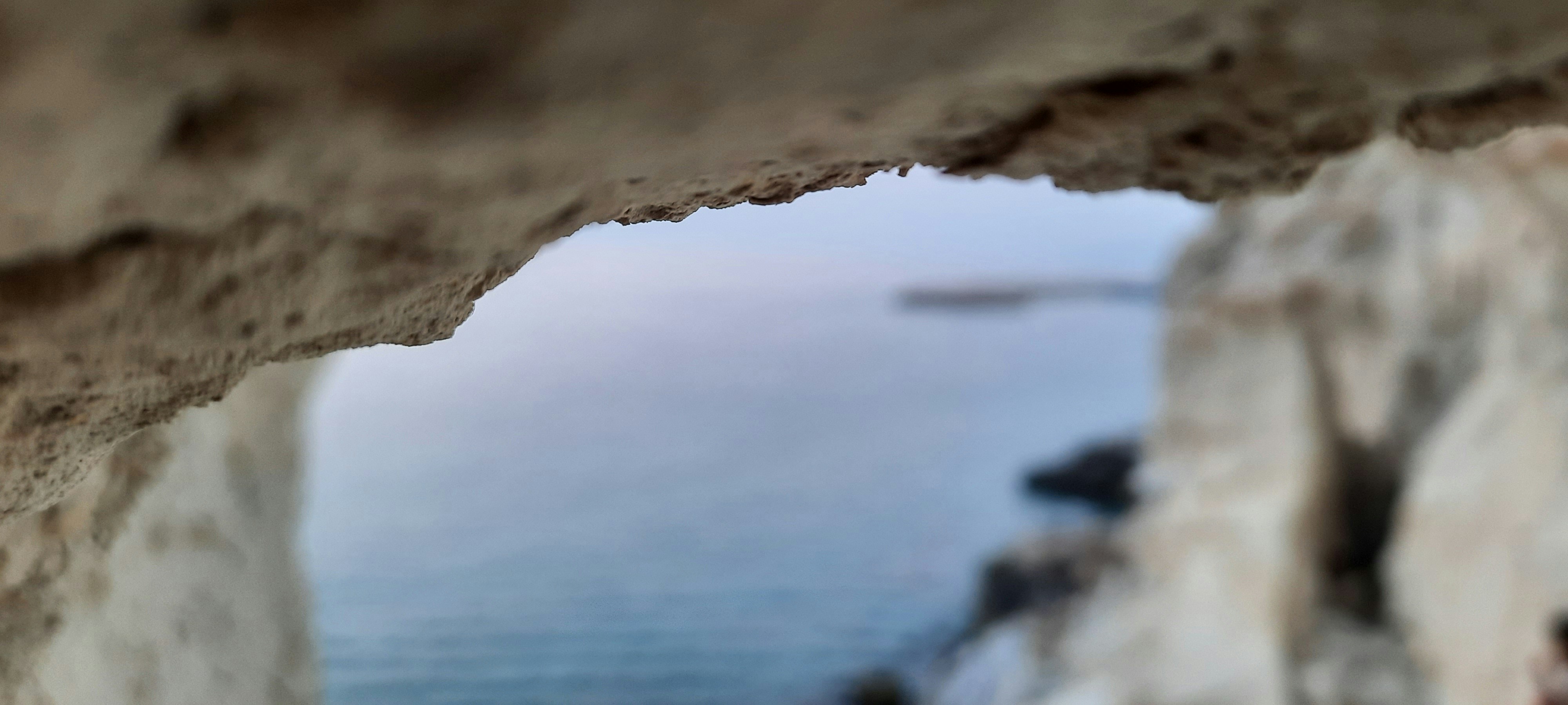 Hidden Viewpoint Through a Coastal Arch