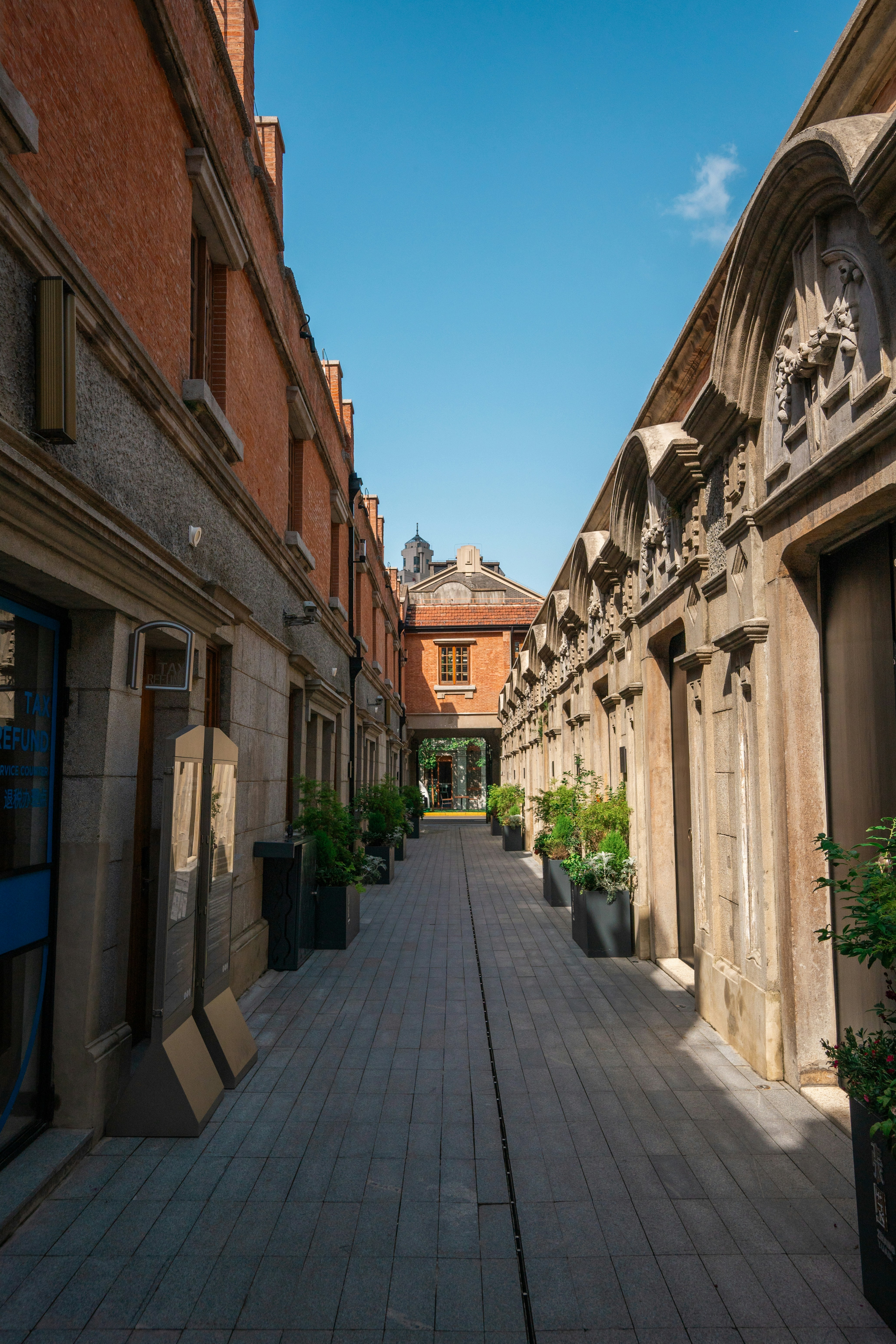 A Lined Passage to a Sunlit Archway