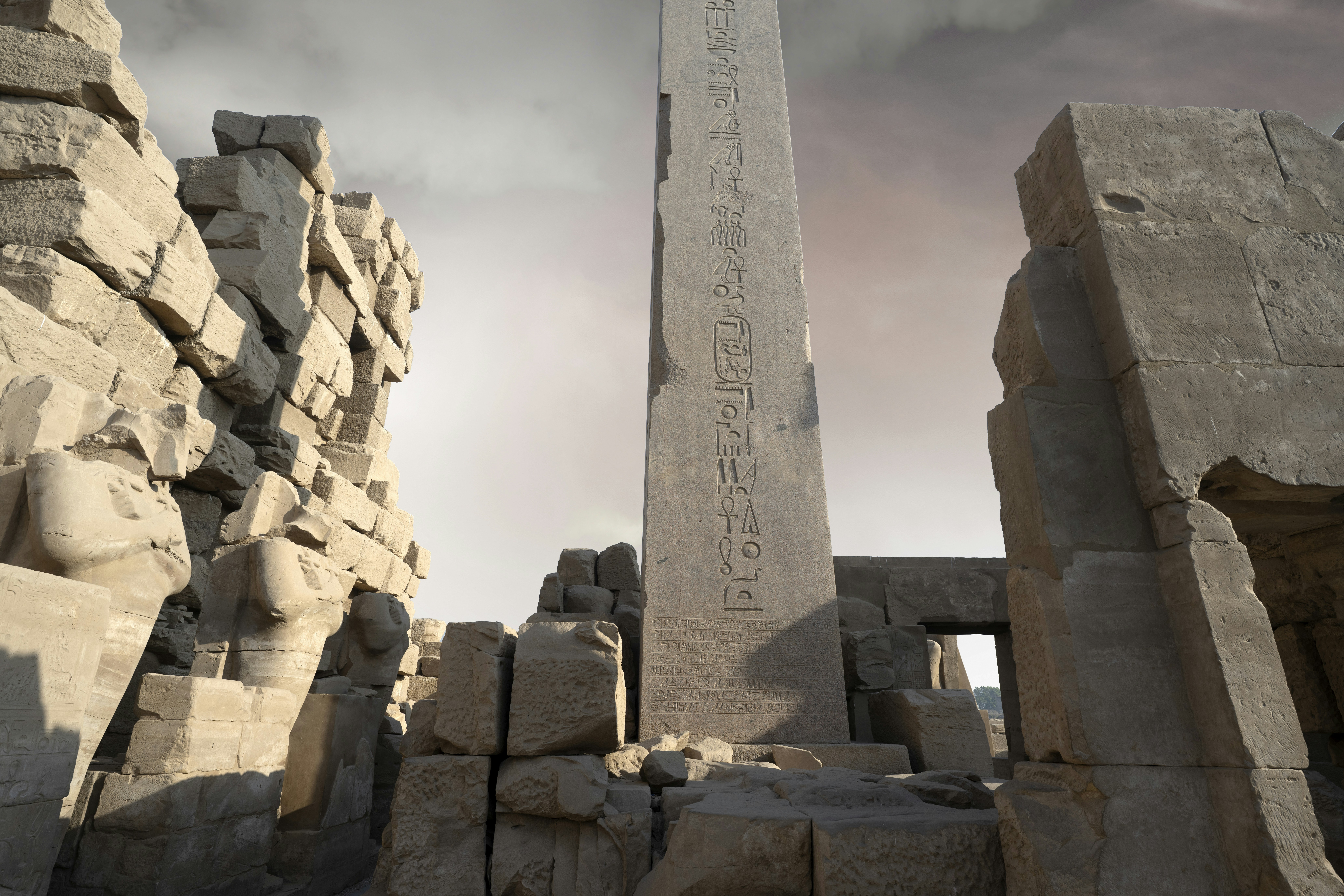 Beacon amid Ruins: An Ancient Obelisk Crowned by Weathered Stone
