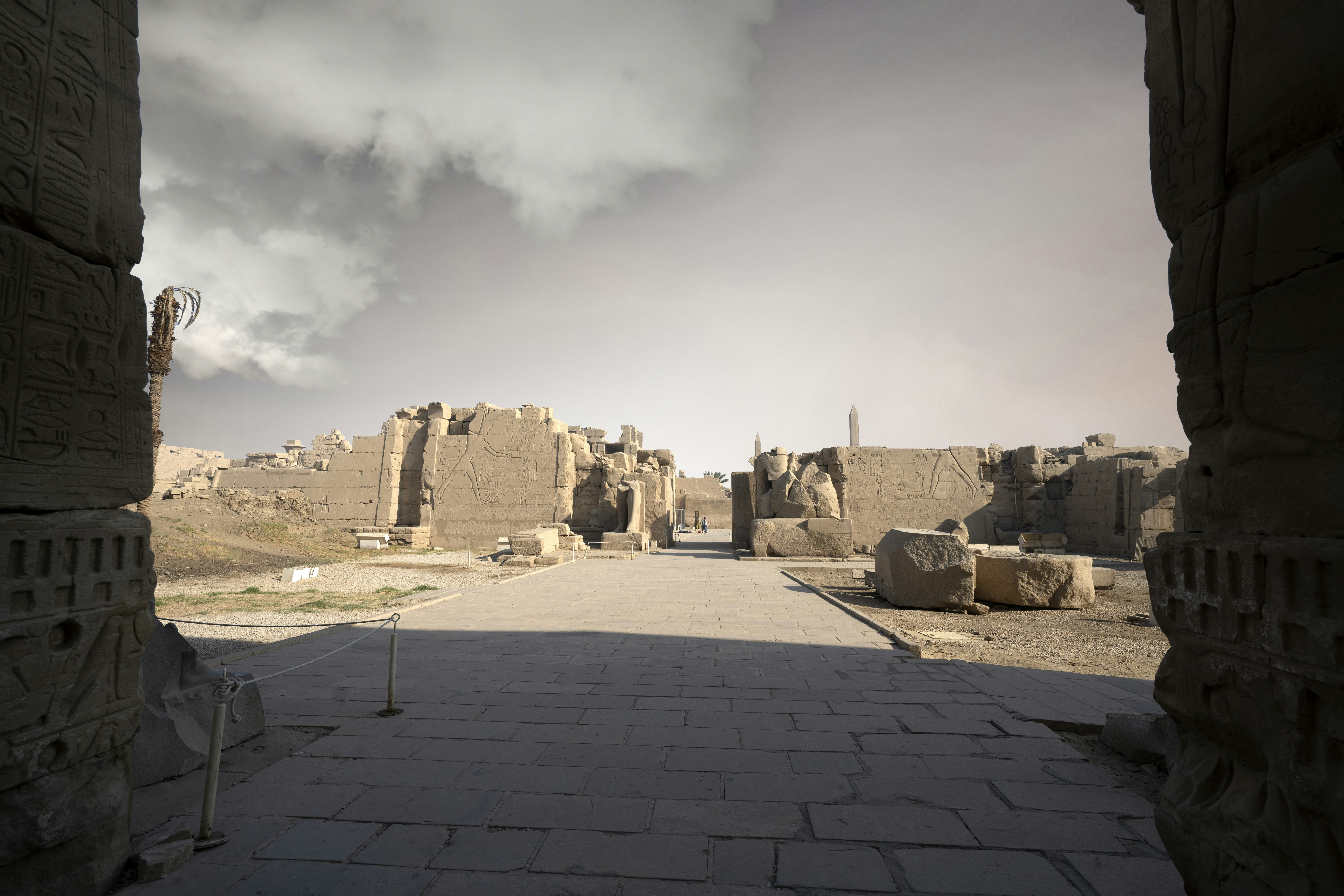 Desert Ruins Framing a Central Pathway under Open Sky