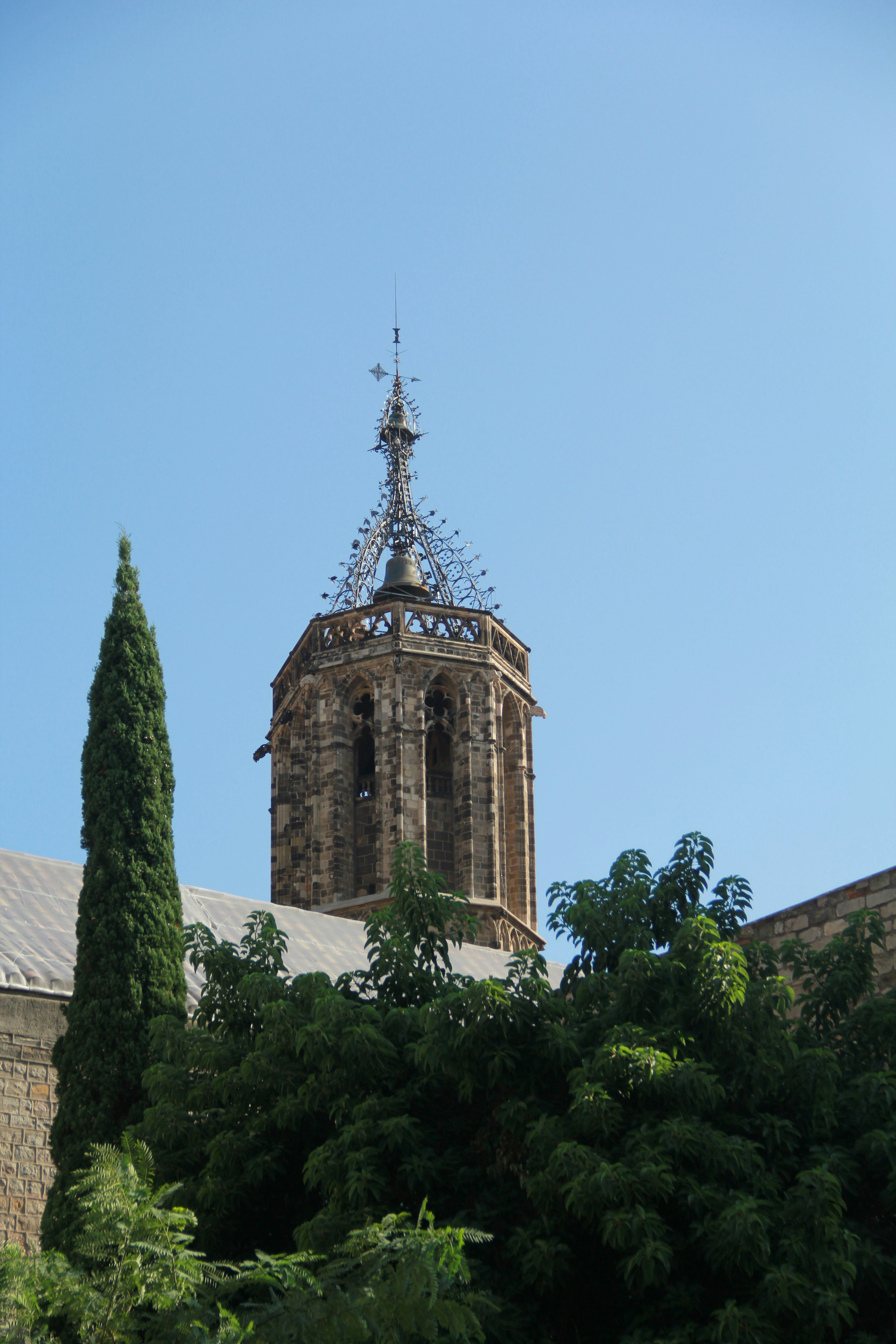 Towering Spire Pierced by Clear Sky