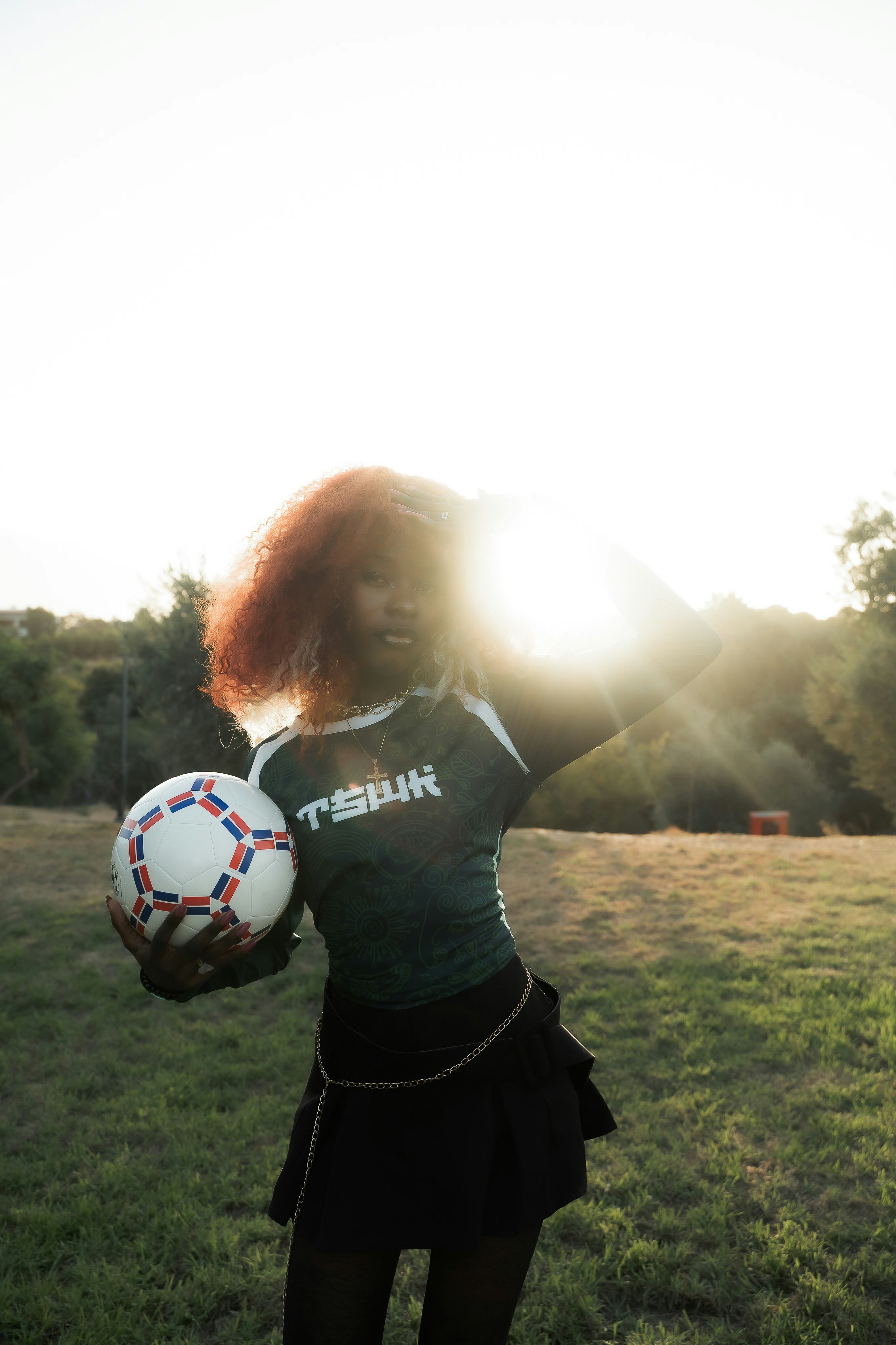 Sunlit Soccer Vibe: A Portrait in Bright Grass and Bold Style