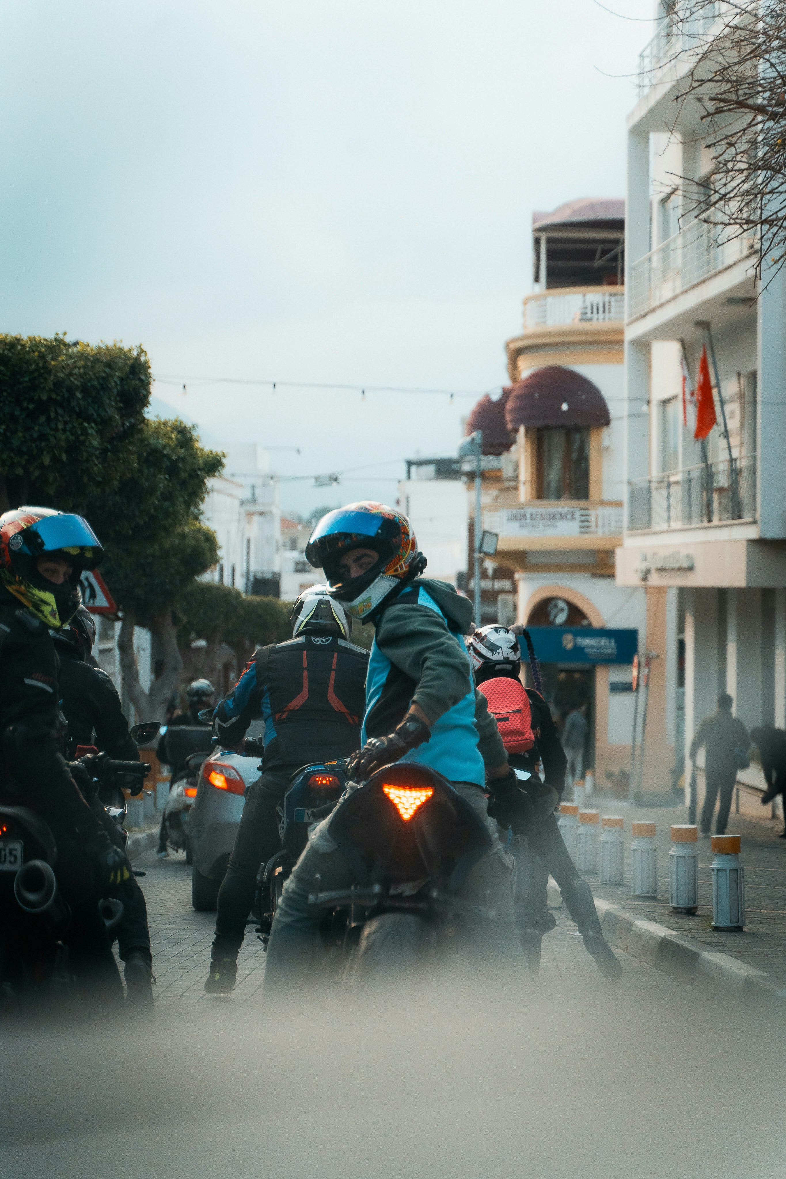 Bike Messenger in a Sunlit Coastal Street Jam