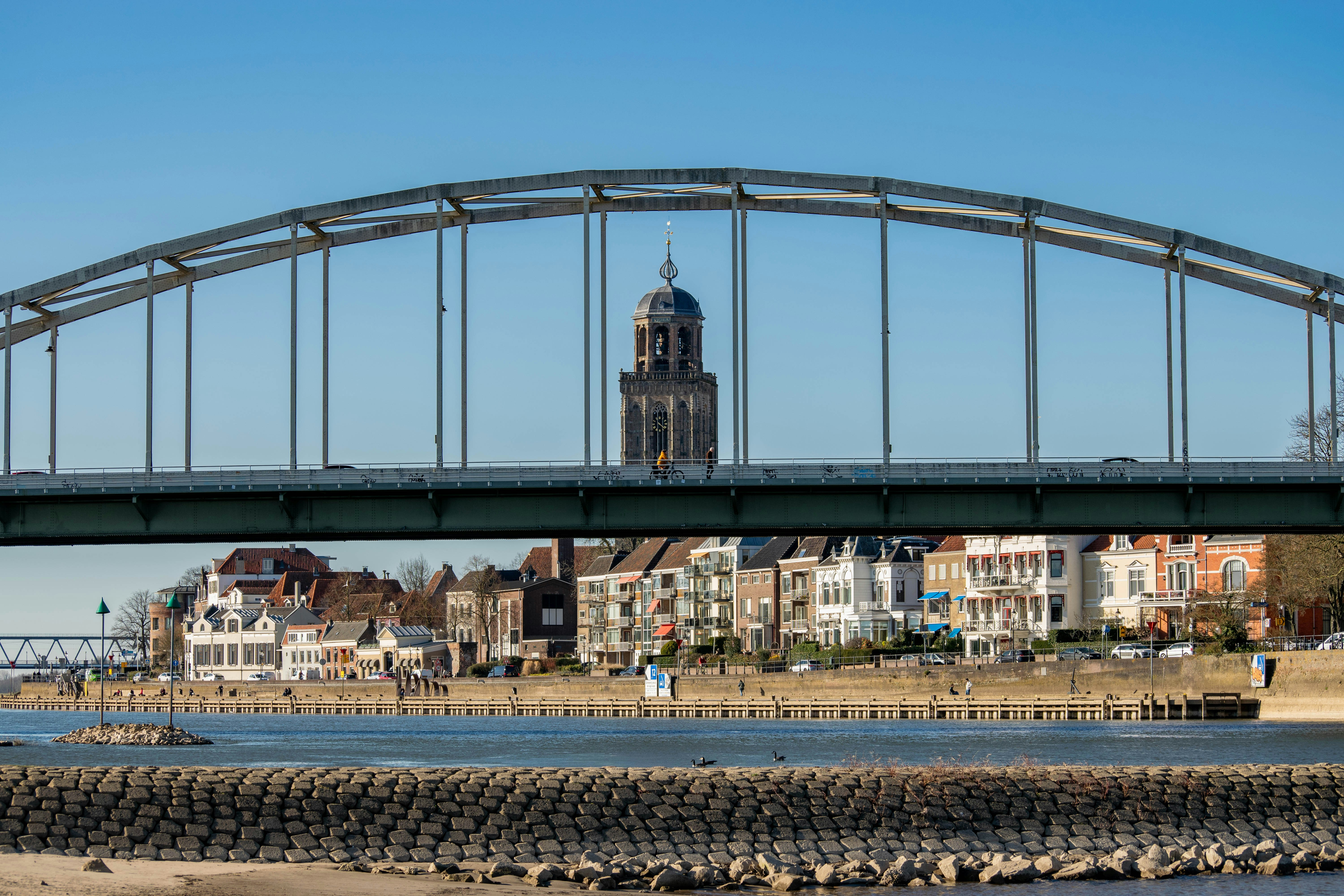 Arched Bridge Over a Seaside Town
