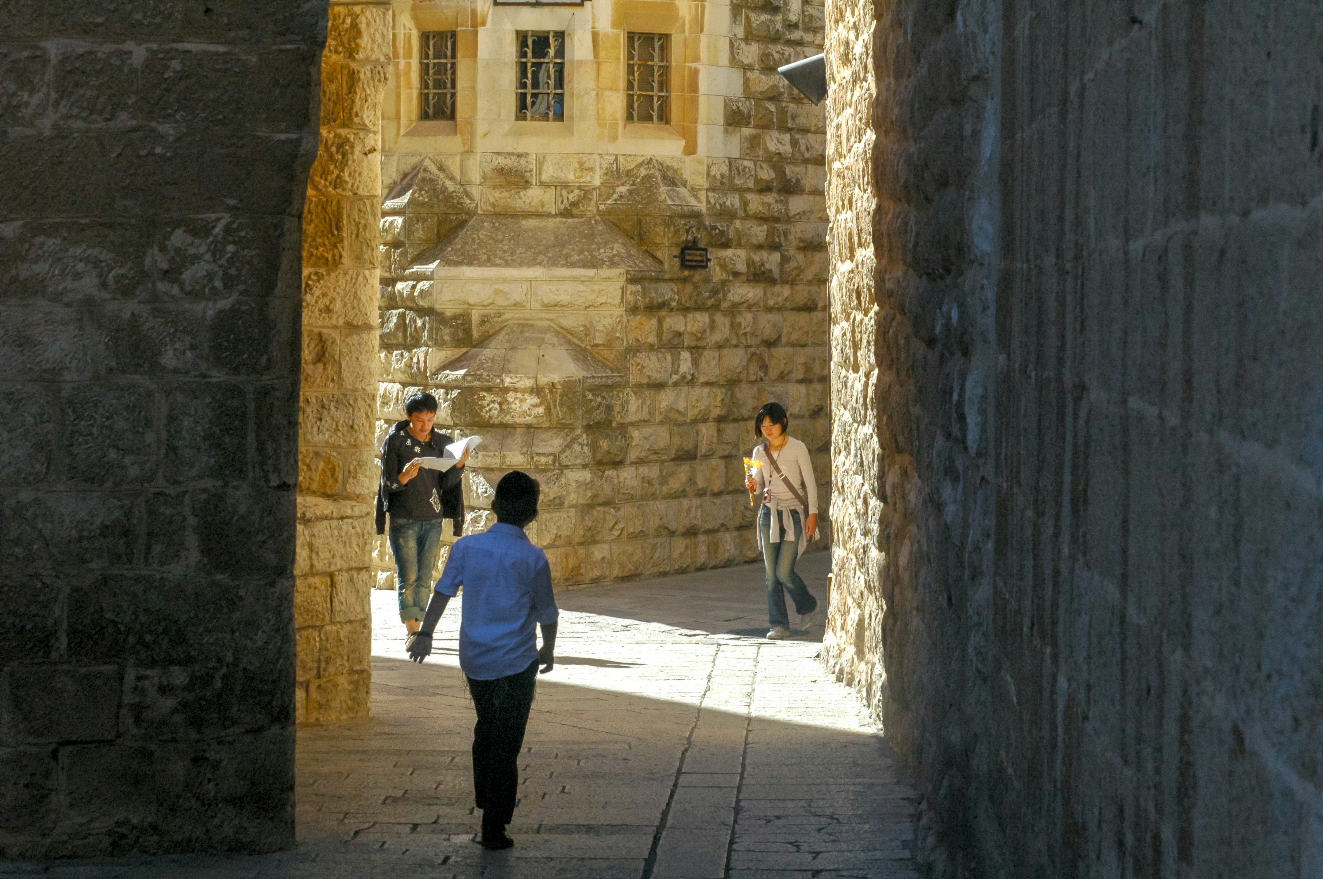 Pilgrims walk a patch toward Zion and the City of David in Jerusalem, Israel.