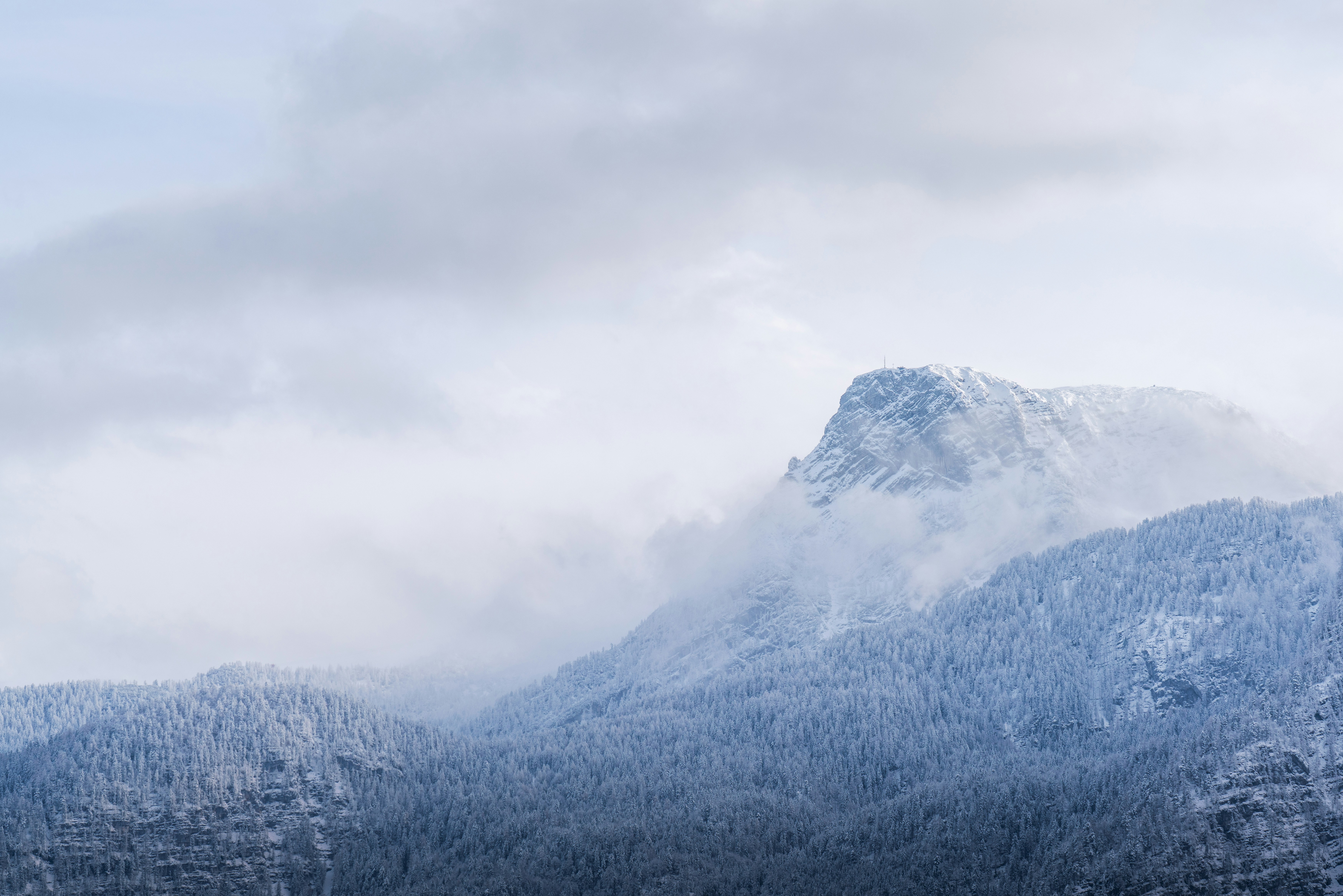 Snow-Capped Peak in Winter Mist
