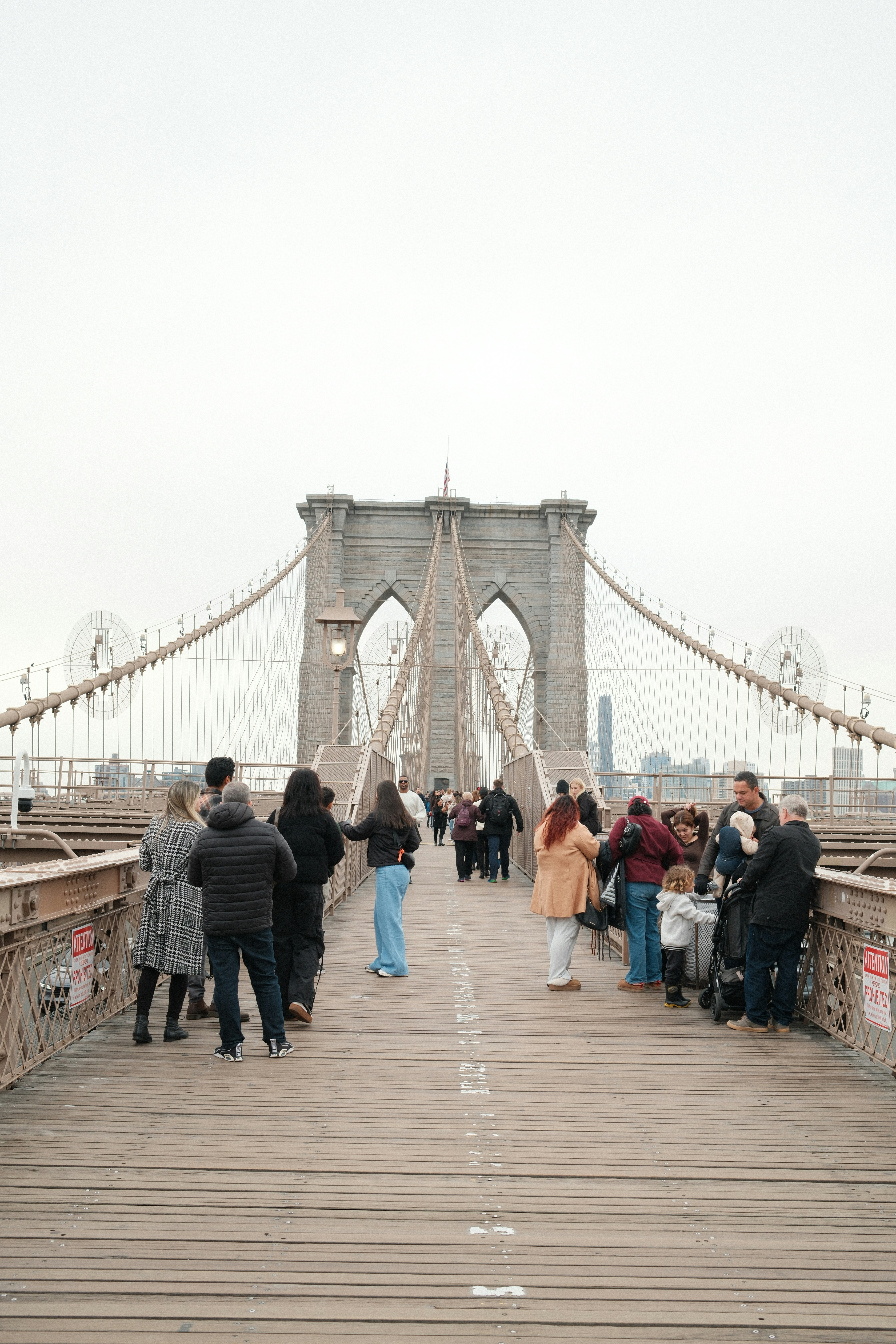Footpath to the Towers: A Crowd Walks the Brooklyn Bridge