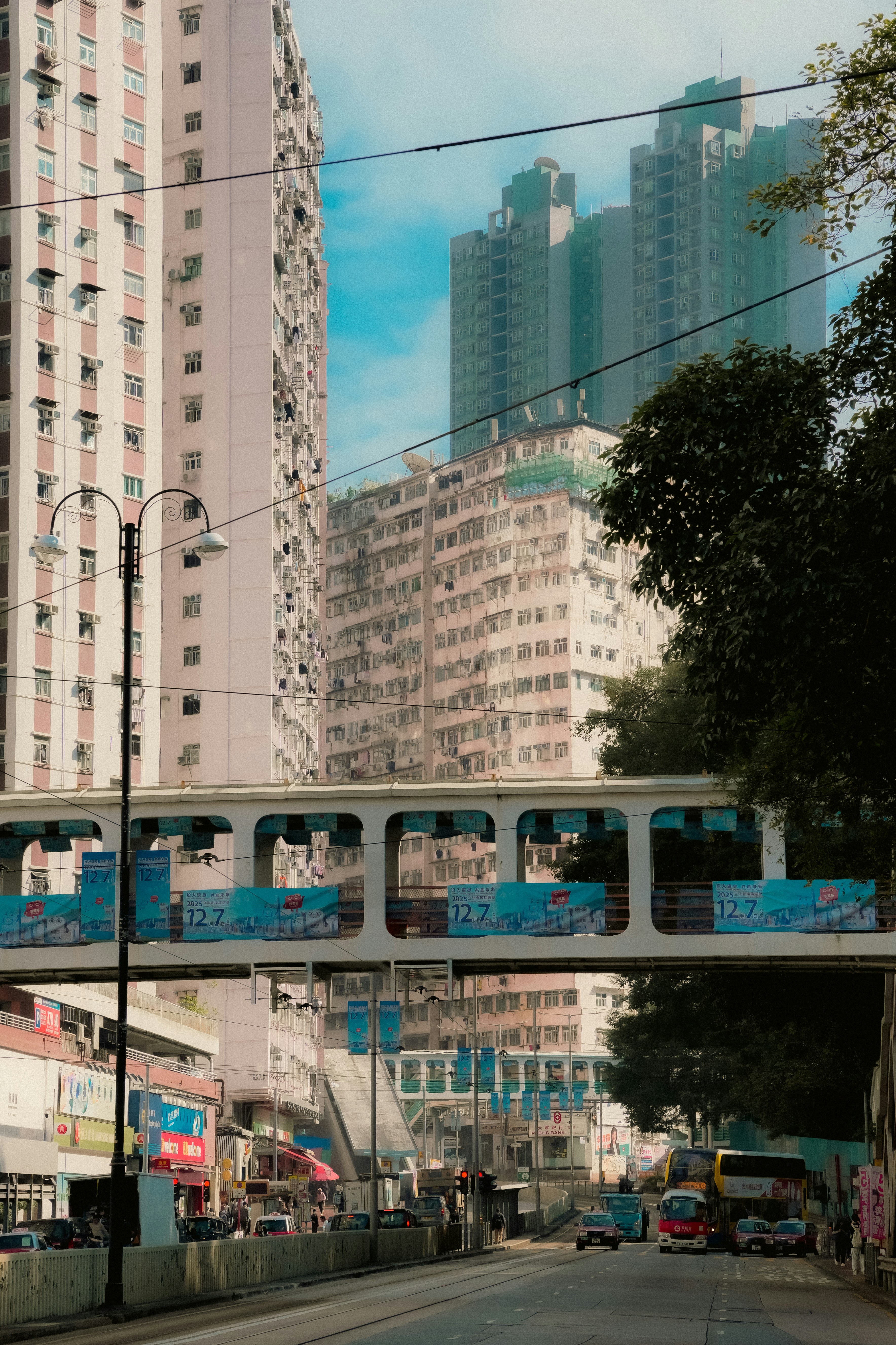 Urban Skyline Overpass: Concrete Towers, Trams and Dappled Light