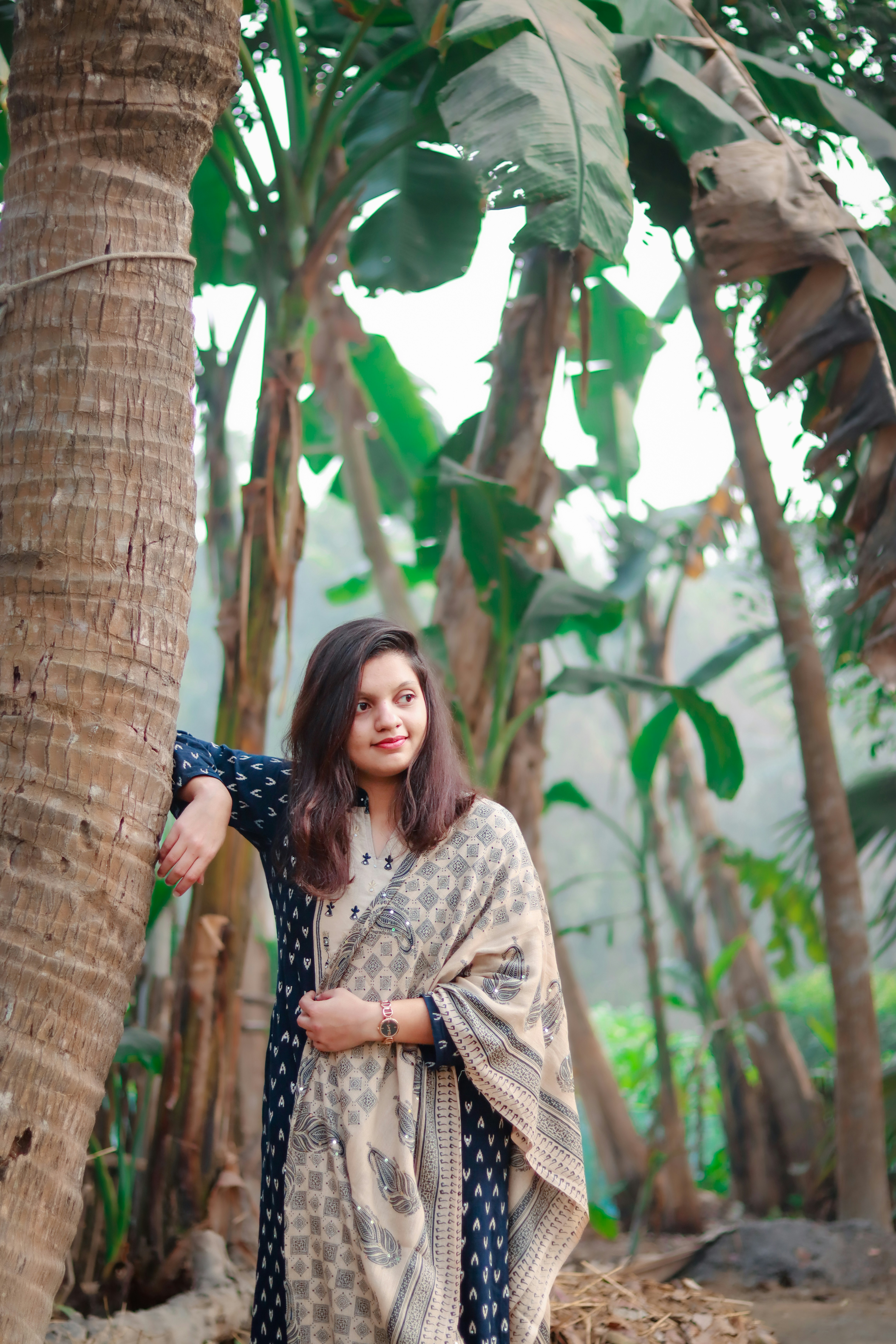 South Asian woman posing in traditional ethnic outfit