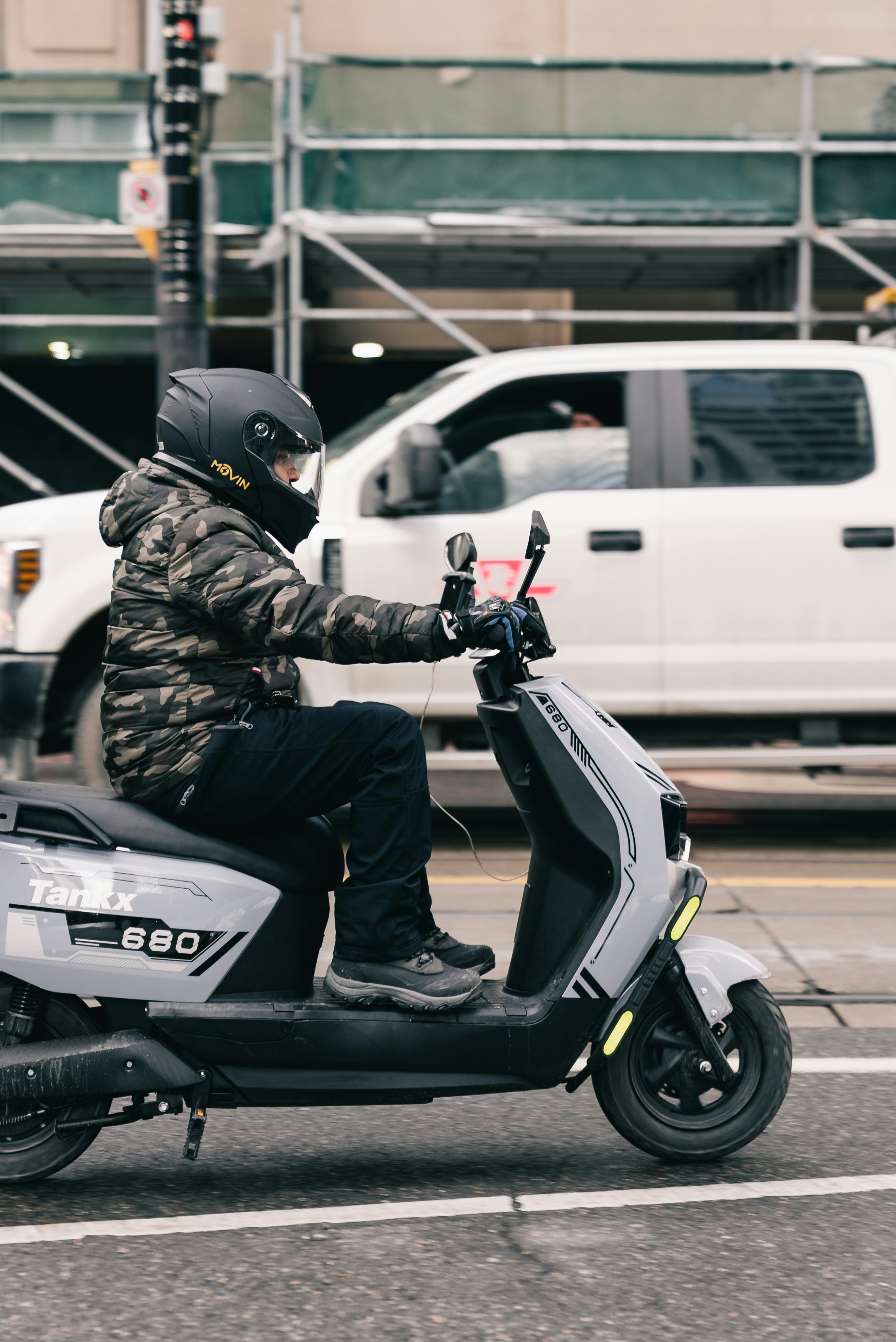 City Ride: Motor Scooter Rider in Motion