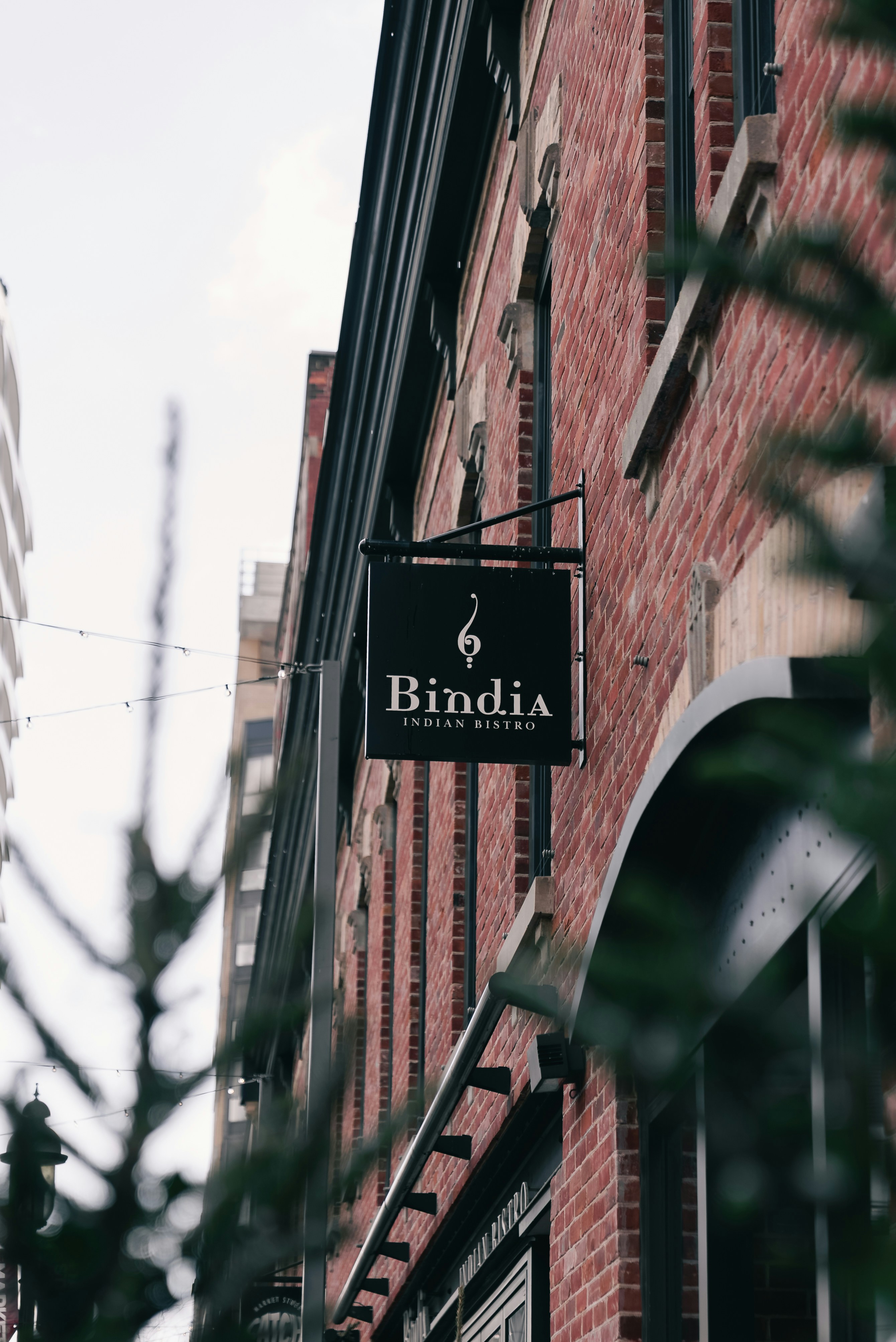 Sign of Flavor: Bindia Bistro Sign Adorns a Brick Lane