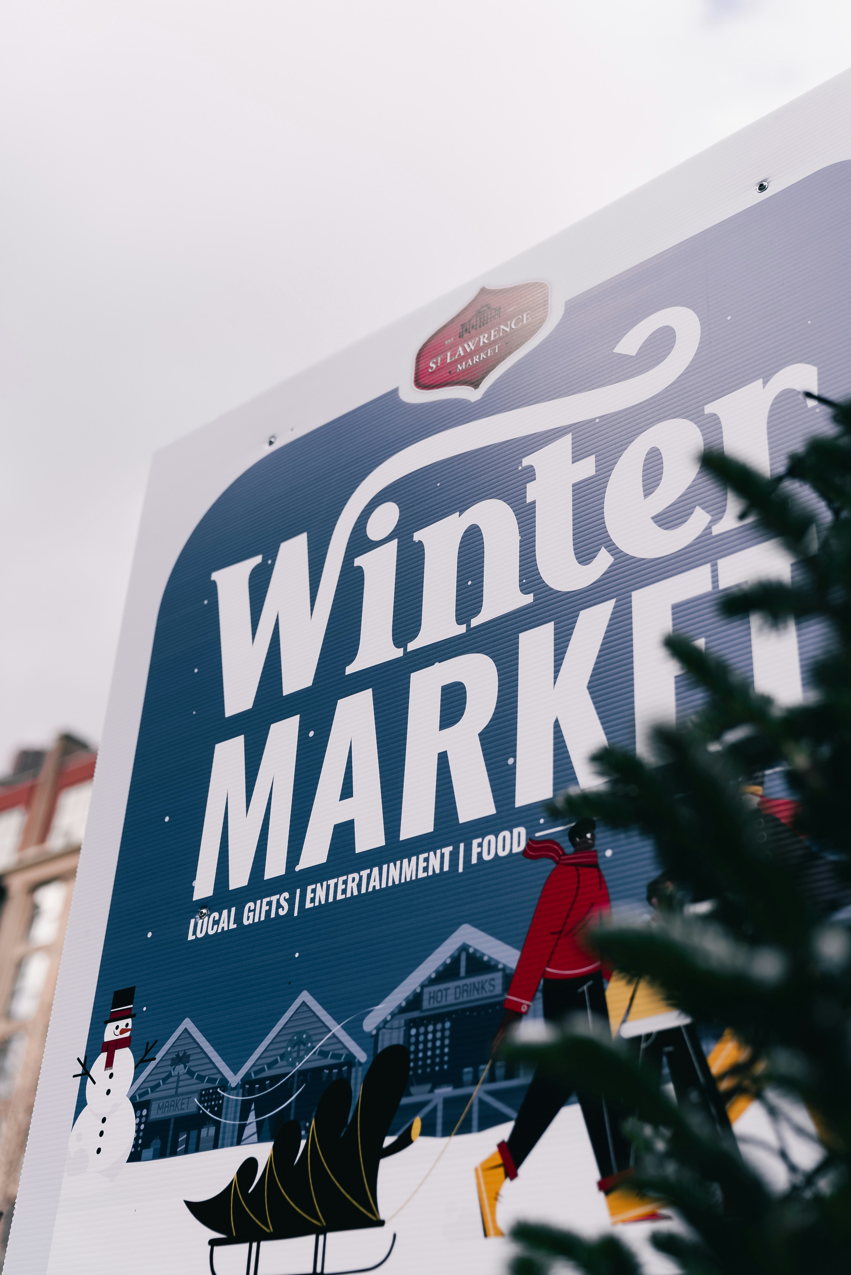 Winter market sign with festive illustrations