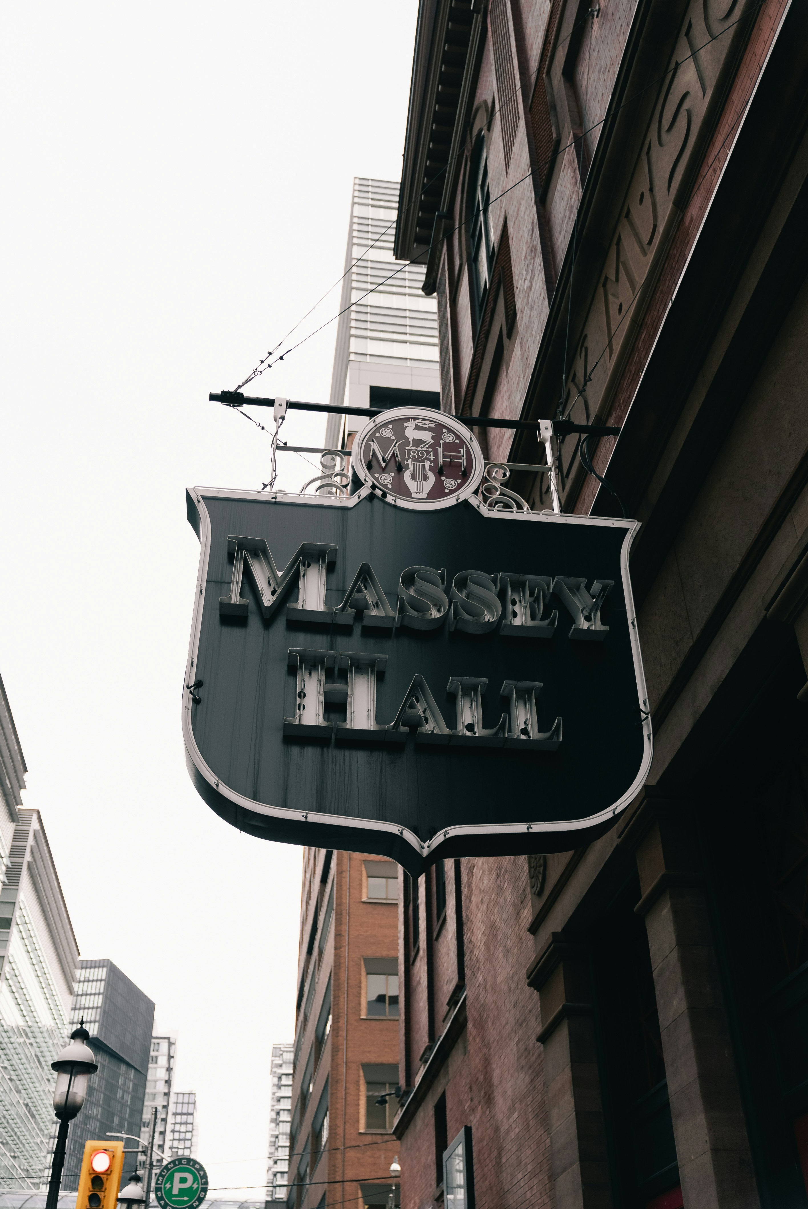 Massy Hall Signage Quietly Guarding the Street Corridor