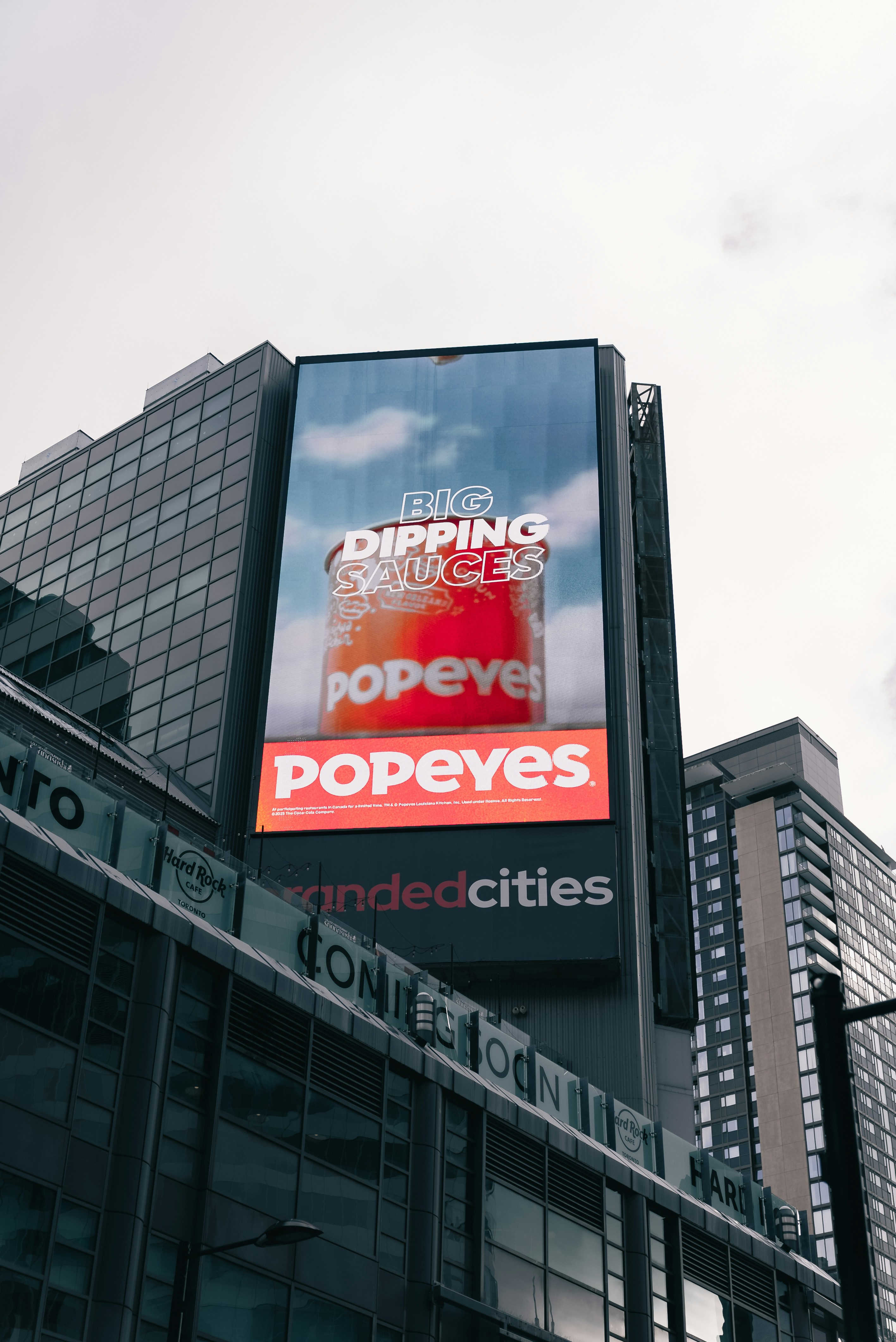 Popeyes billboard advertises big dipping sauces. photo – Free ...