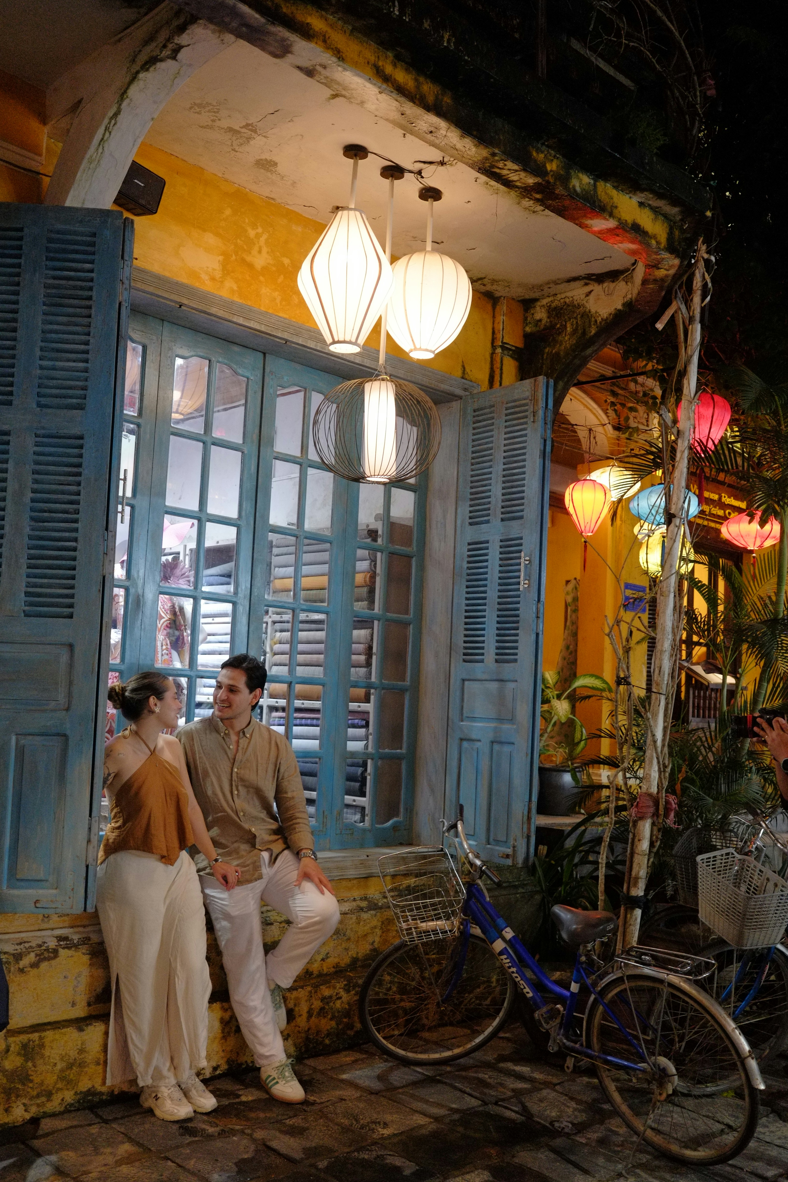 Lanterns and Lovers by the Blue Shutters