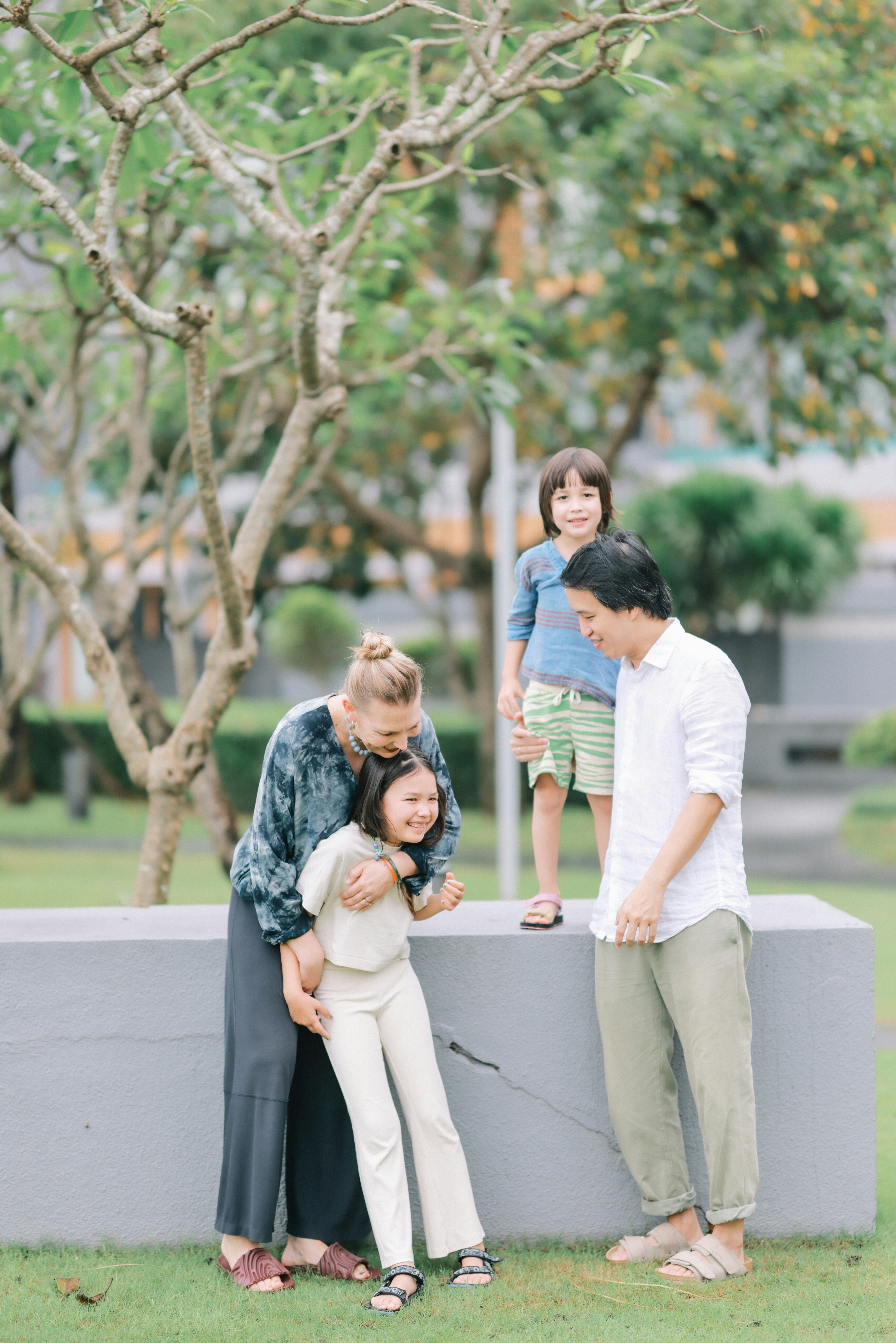 Family Moment on the Park Wall
