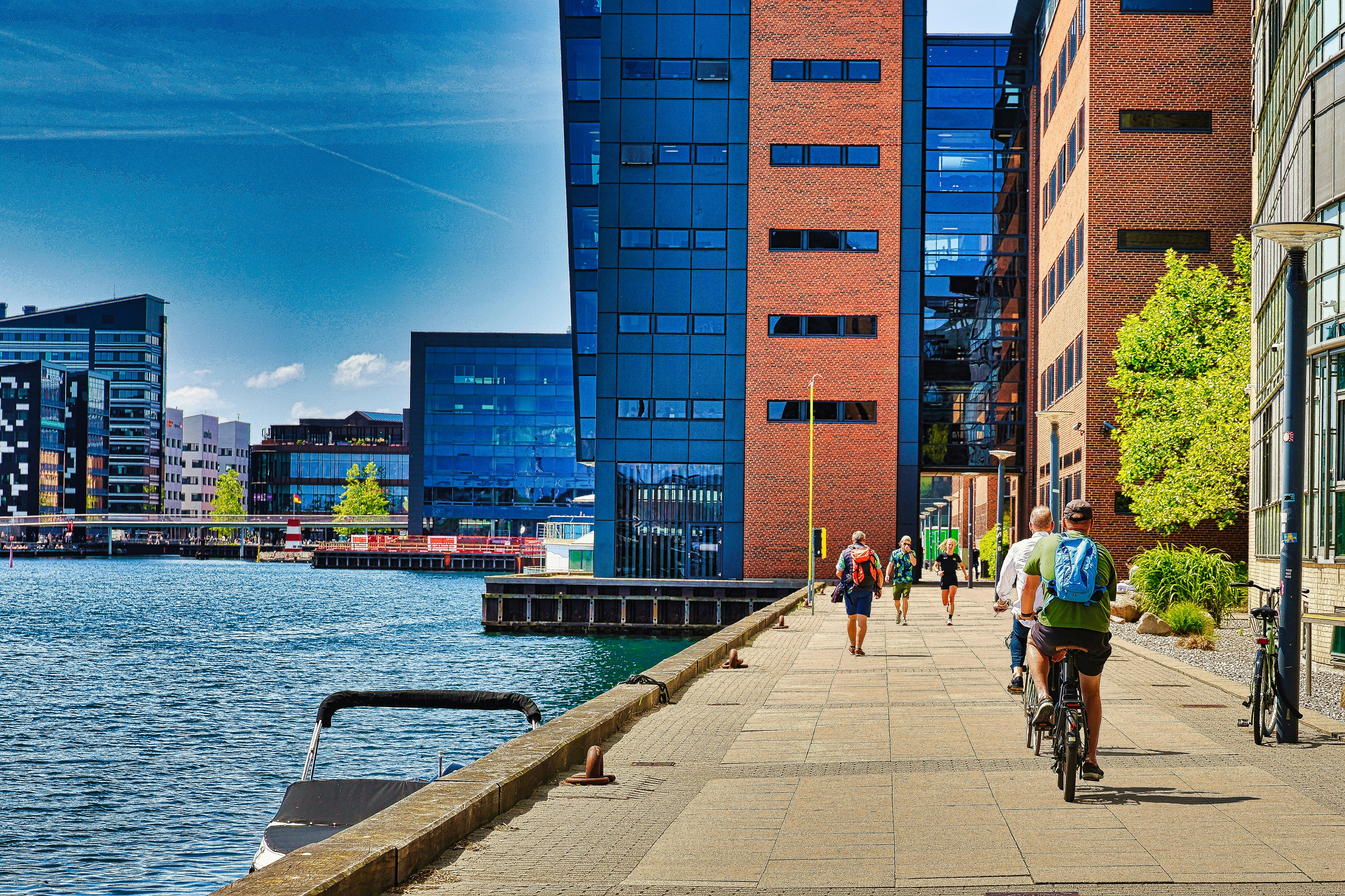 Urban Riverside Bicycle Path under Blue Skyline