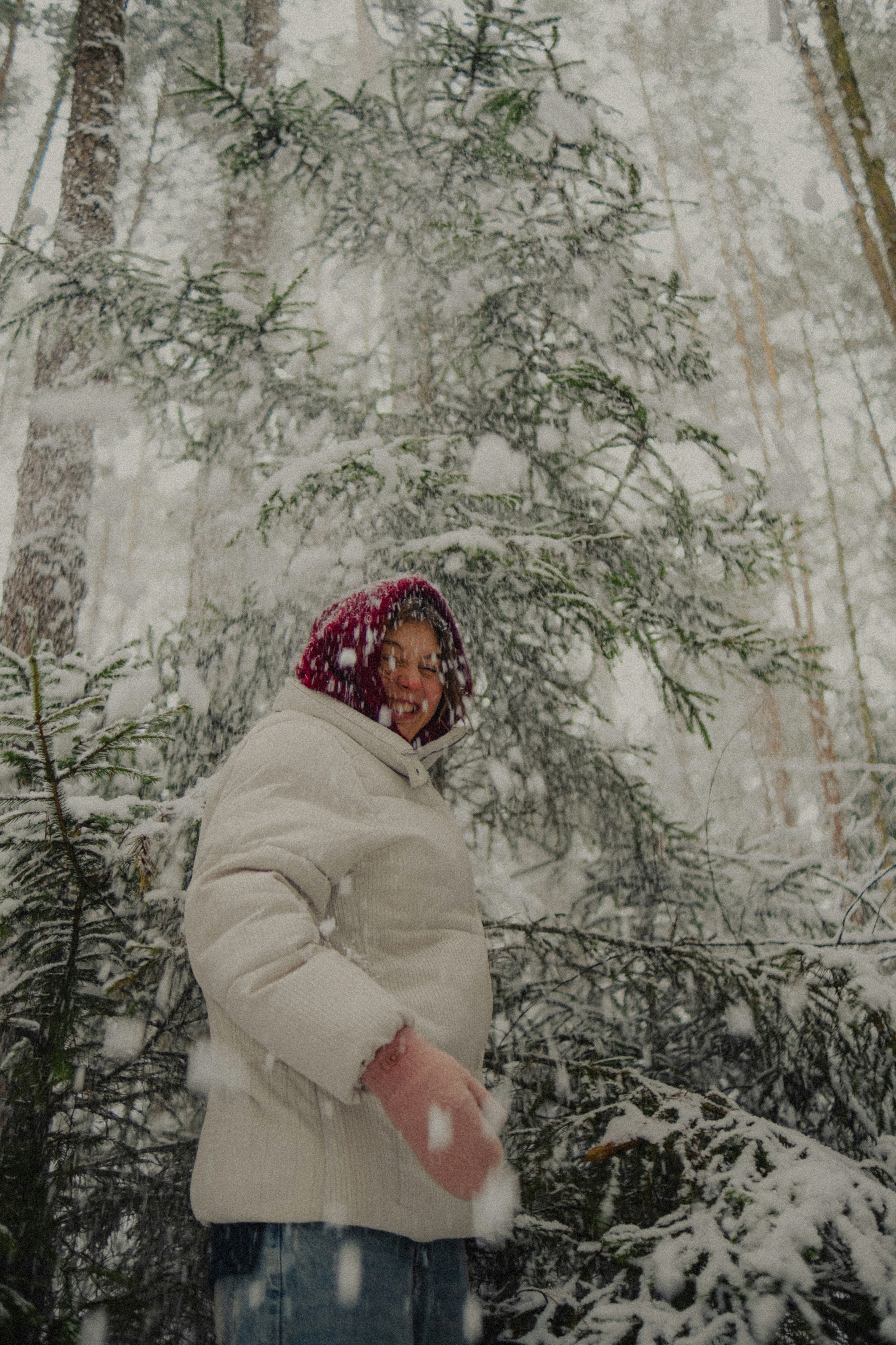 Snowbound Smile: A Pregnant Winter Portrait in the Pines