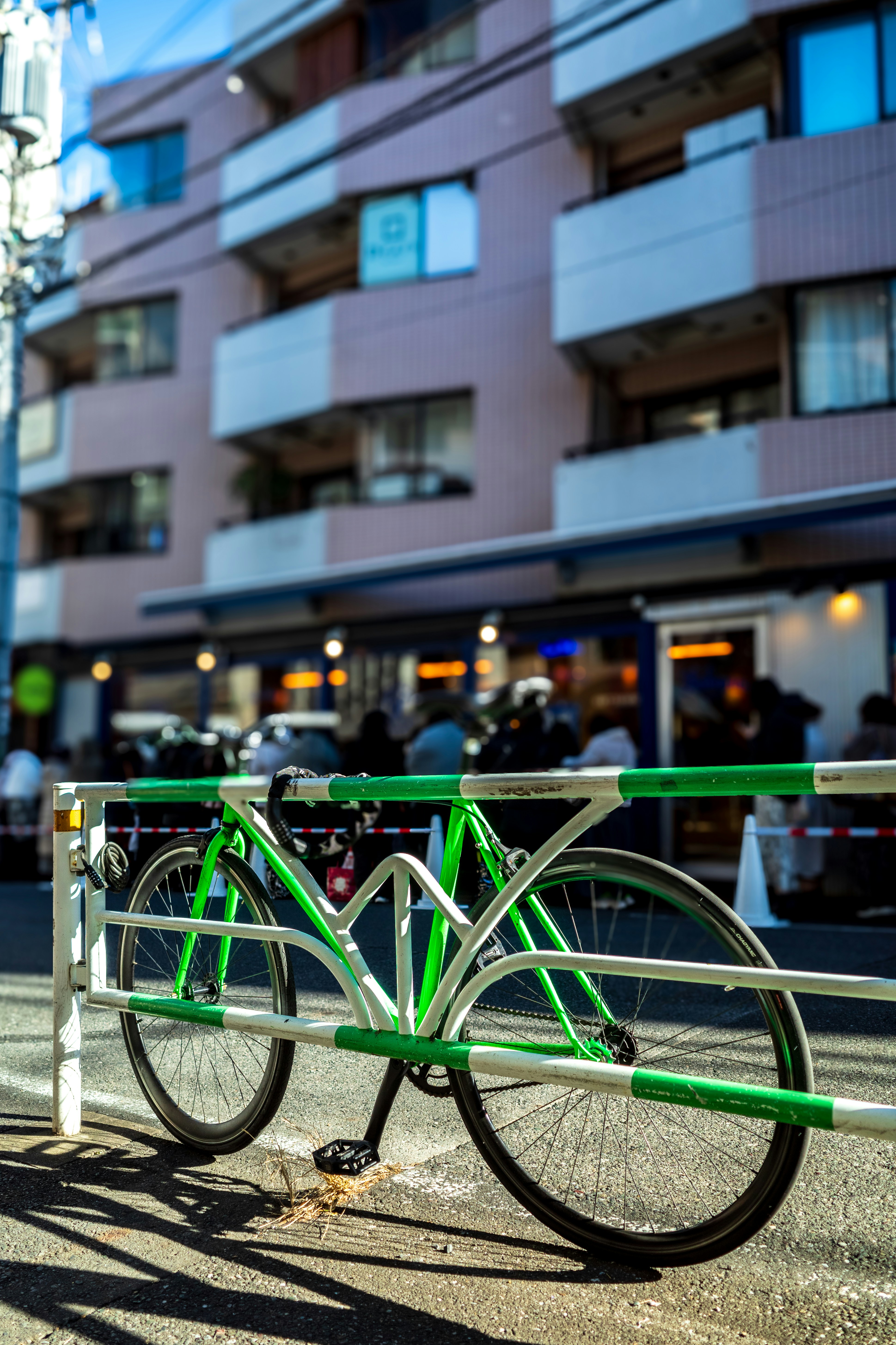 Green Bicycle in Urban Sunset Frame