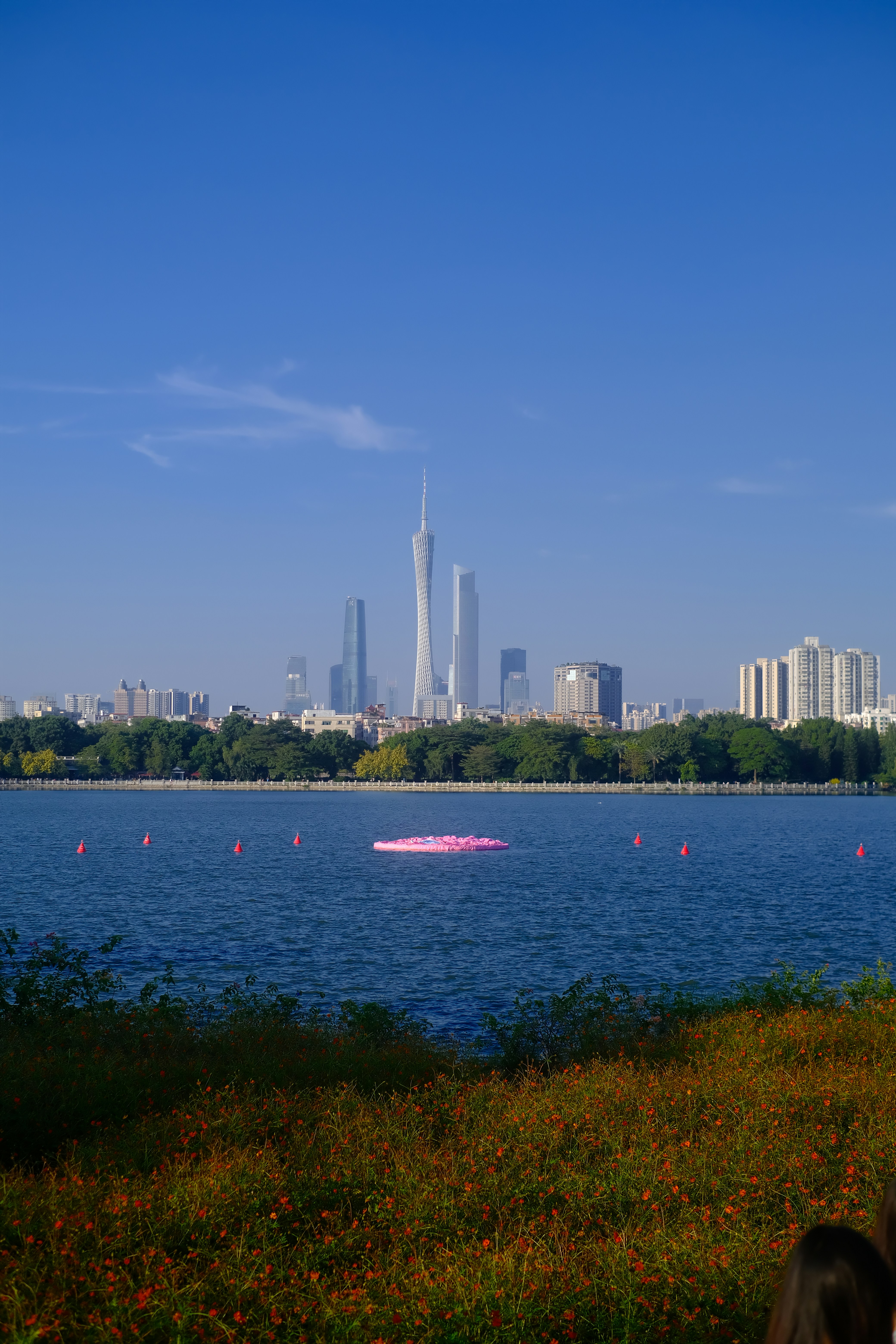 Skyline Reflections: Center Stage over a Quiet Lake